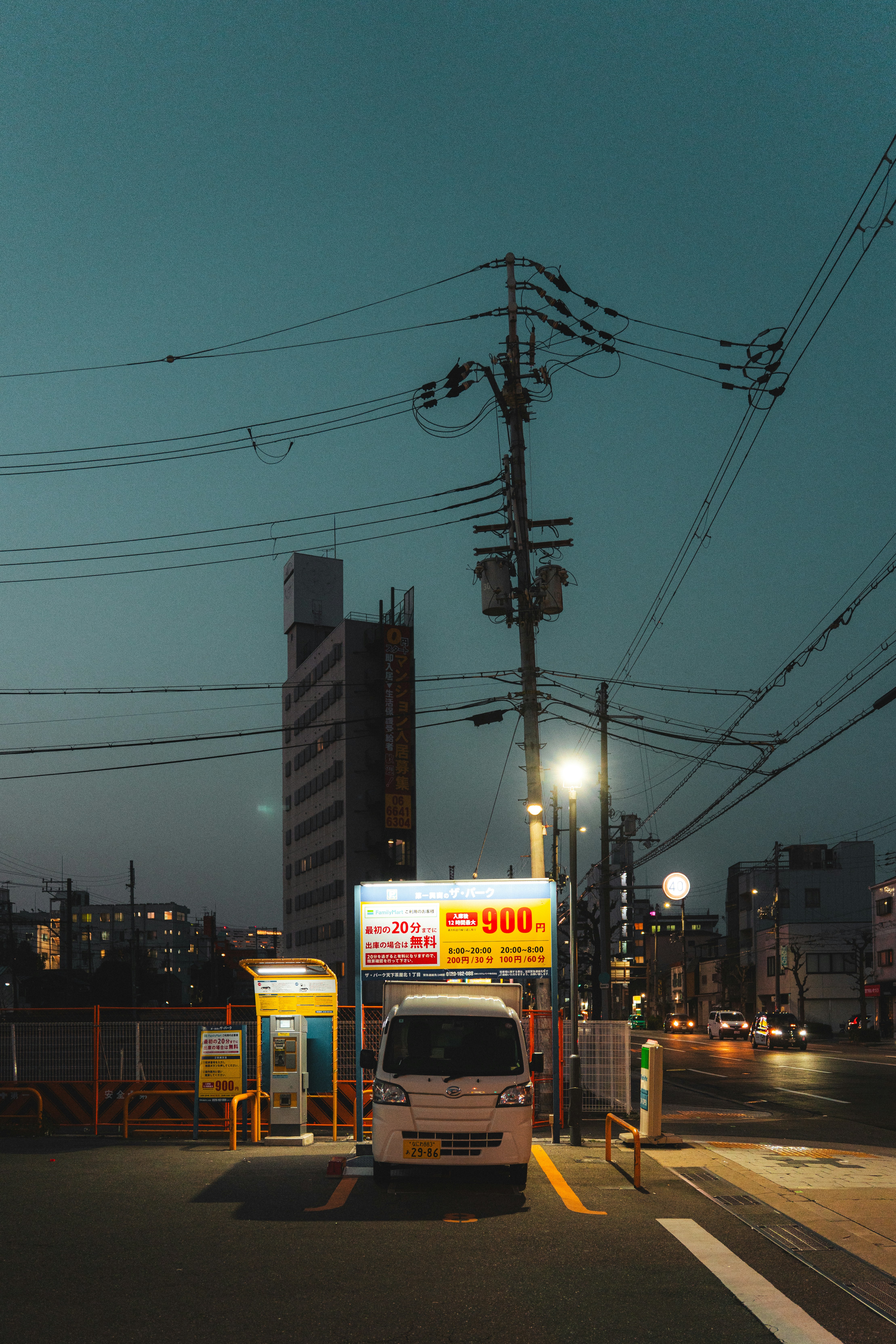 Evening Stopover: Neon Taxi in a Quiet Japanese Street