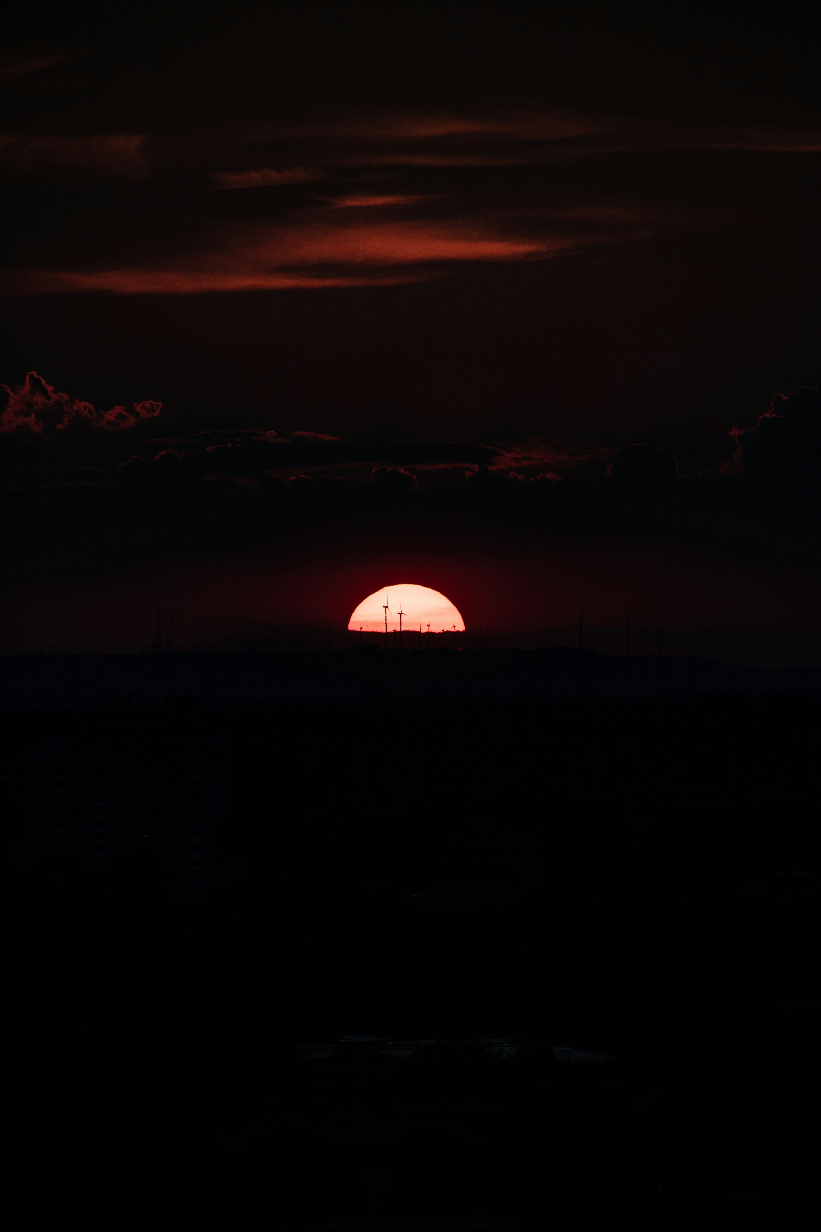 Low Sun, High Horizon: A Crimson Sunset on The Quiet Edge