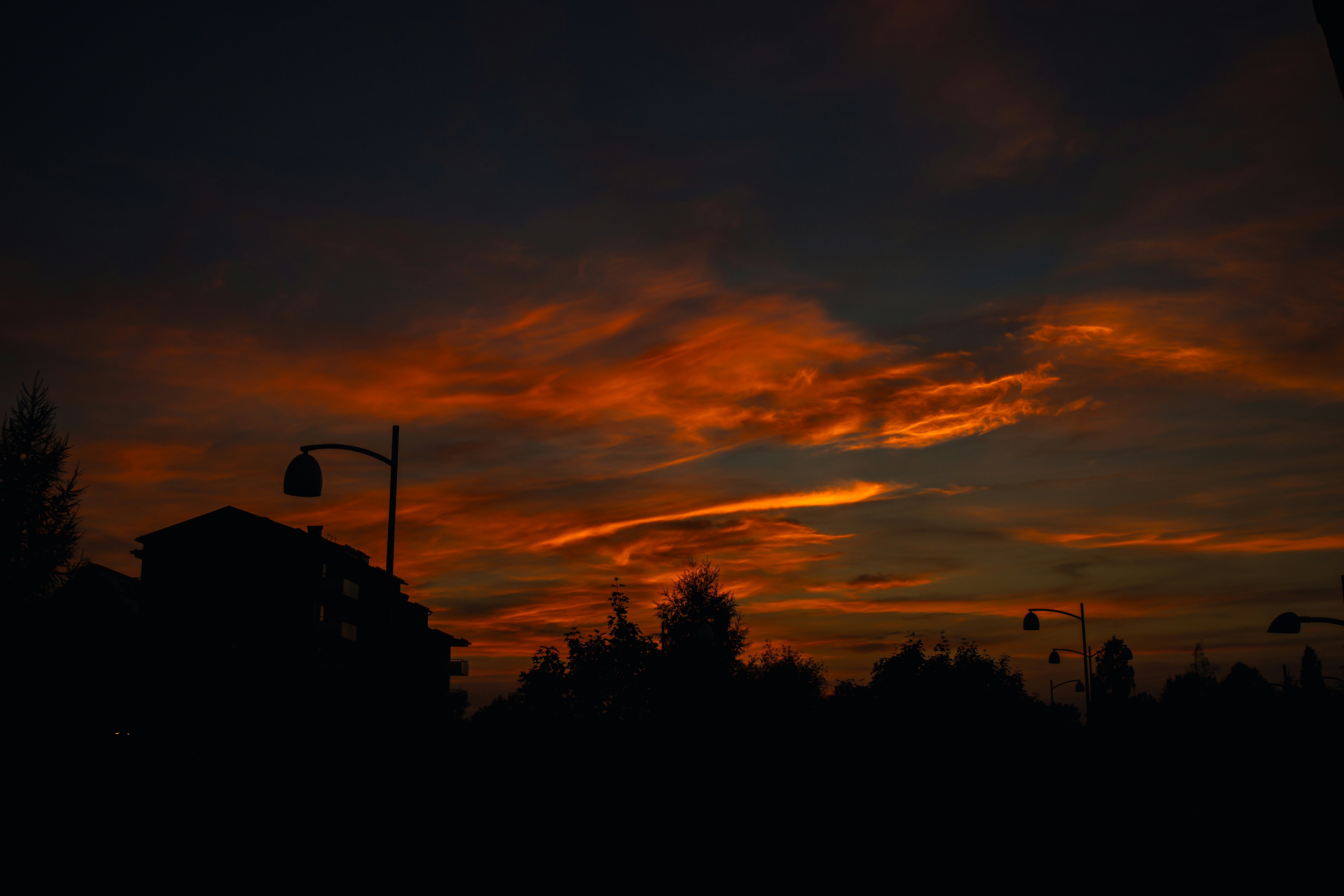 Crimson Skies Above the Silent Suburb