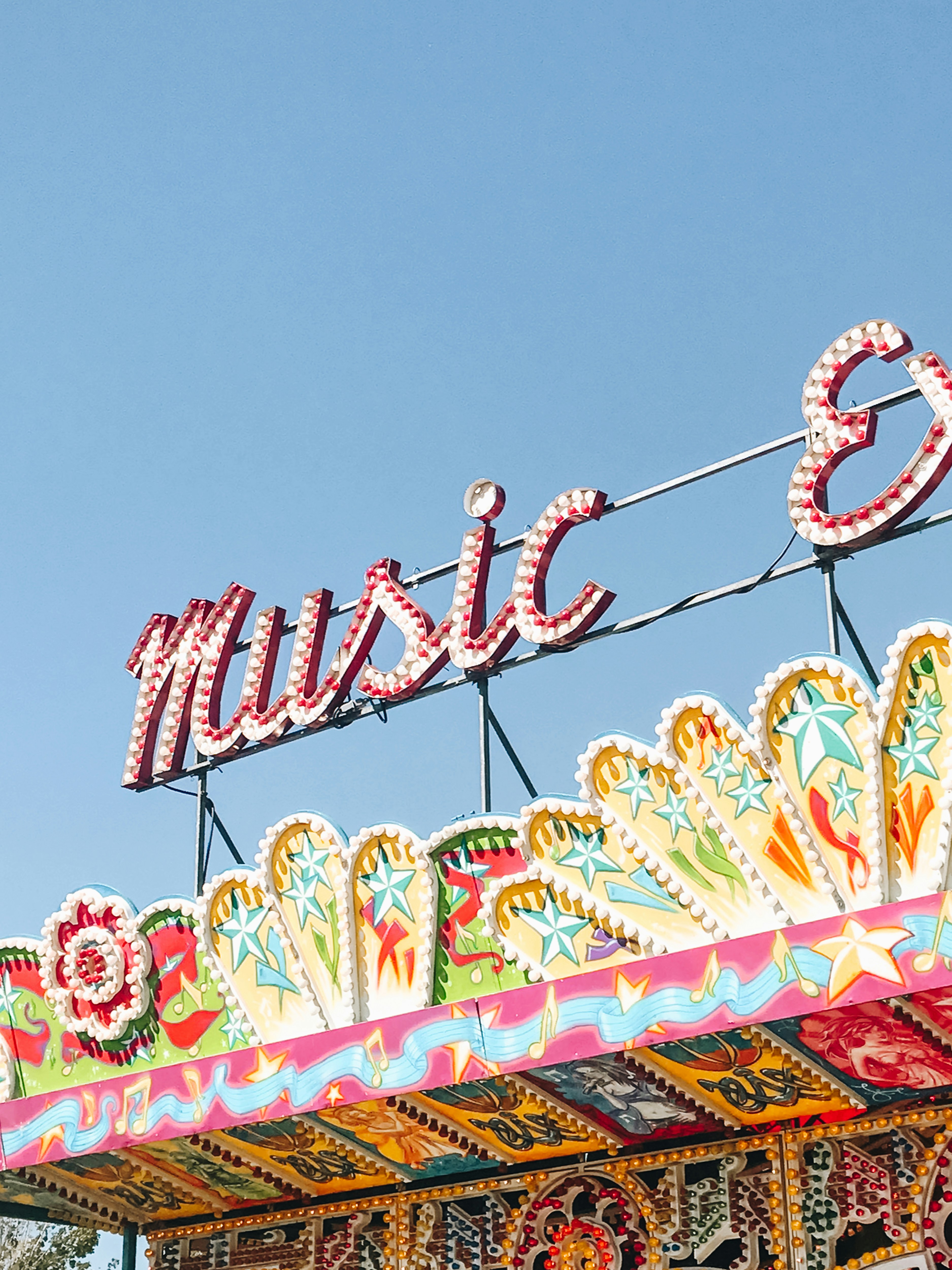 Neon Script Over Carnival Facade