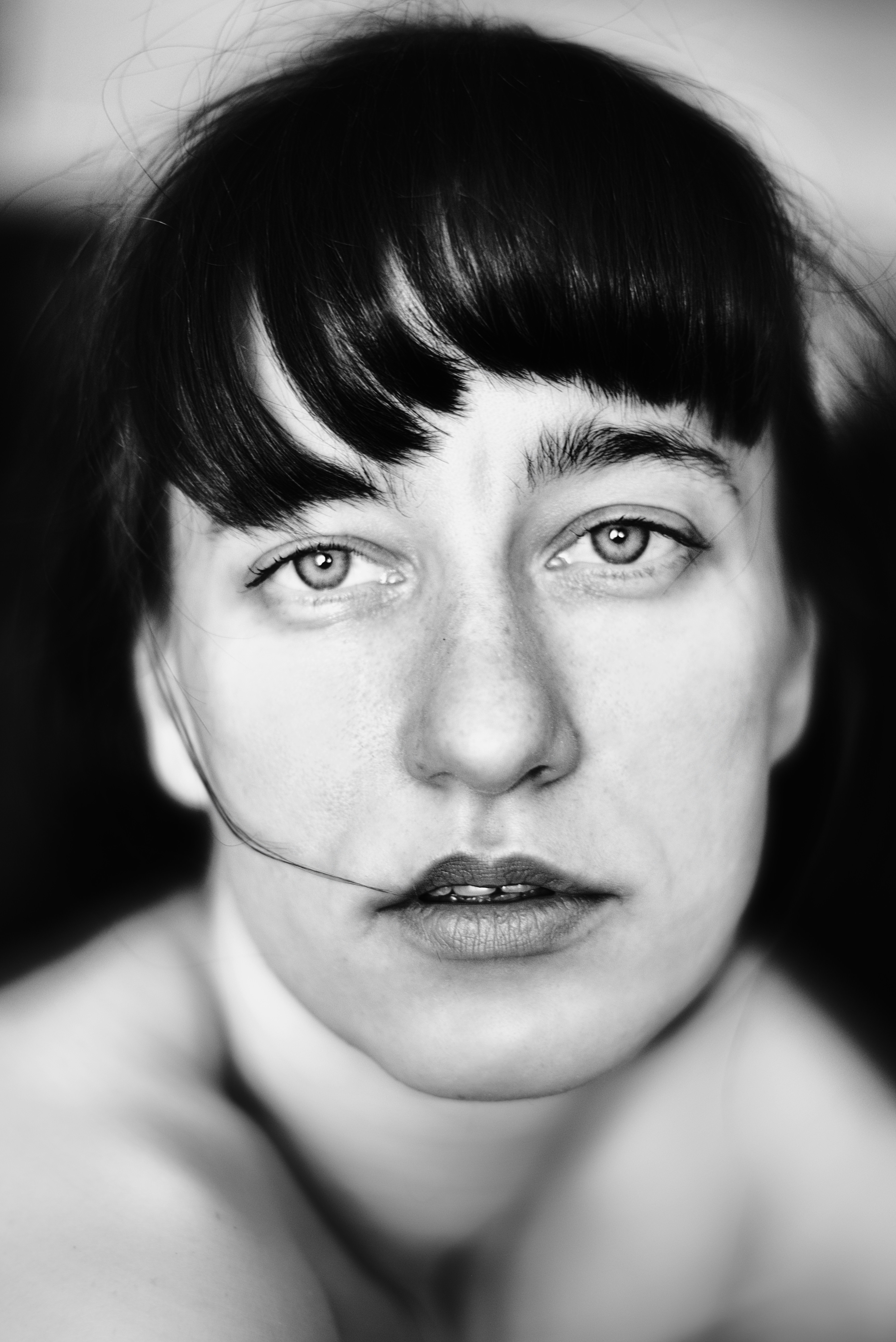 Direct gaze: a monochrome portrait of quiet intensity