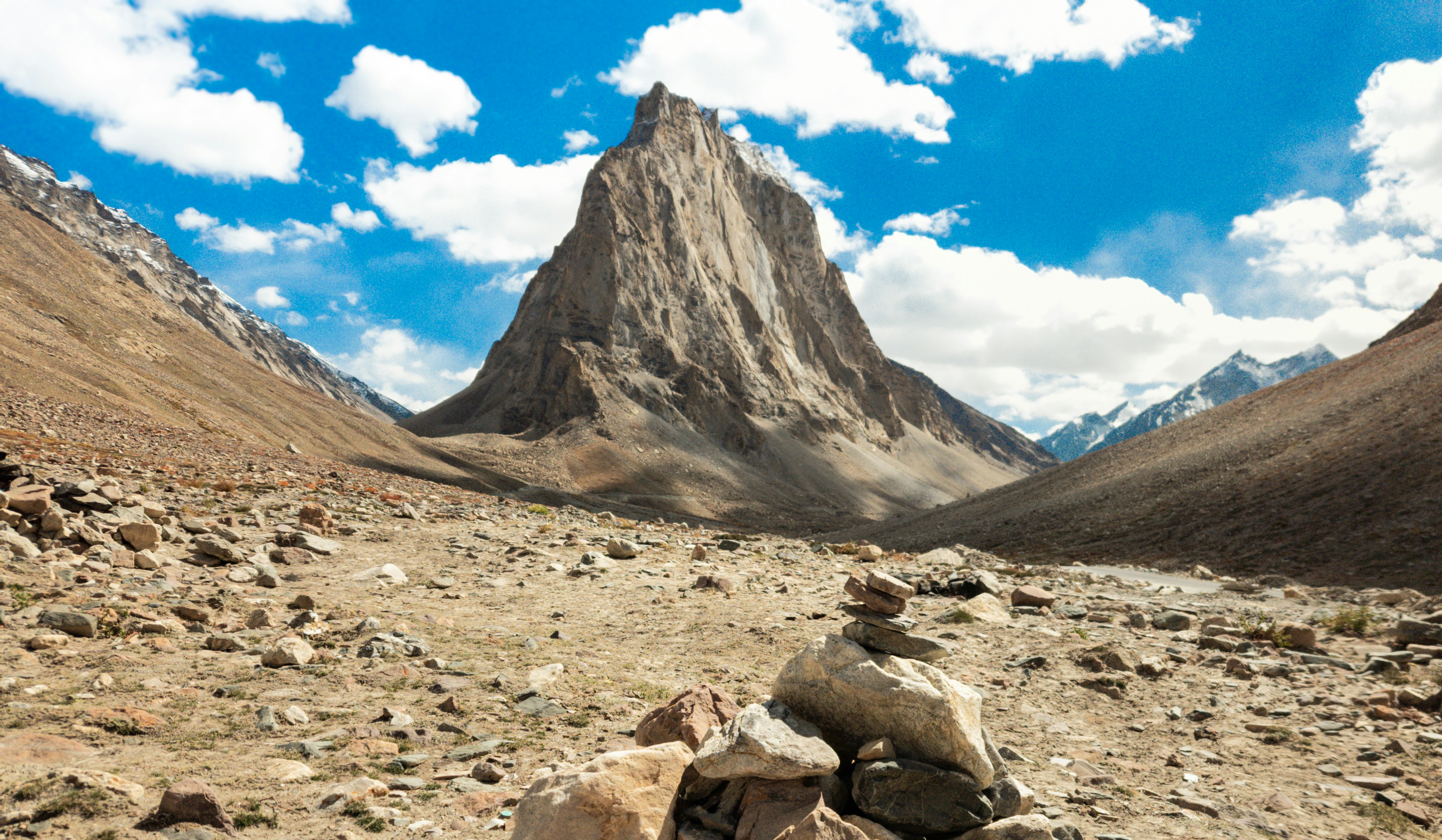 Peak Convergence at the Valley Gate