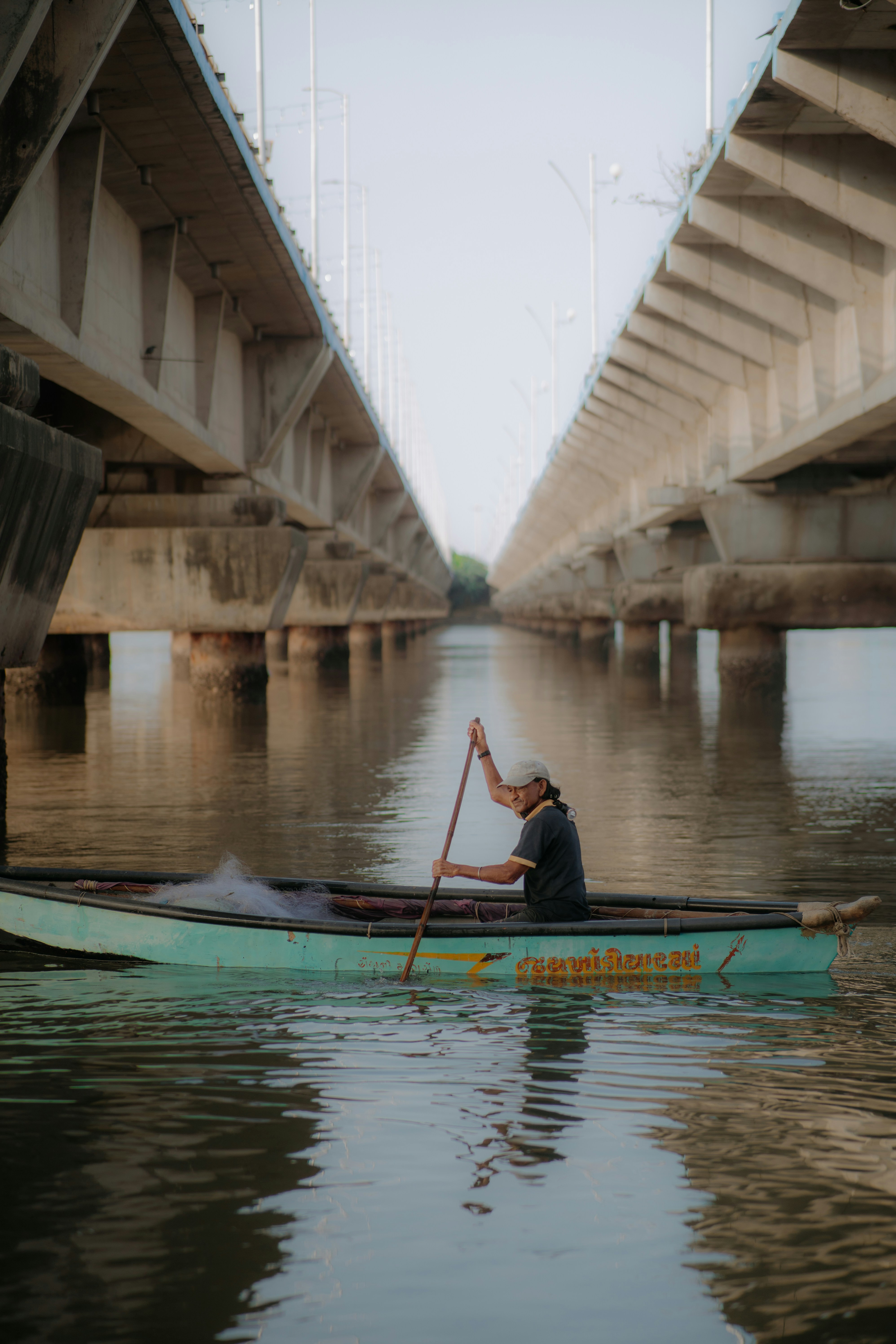 Boatman at the Converging Spans
