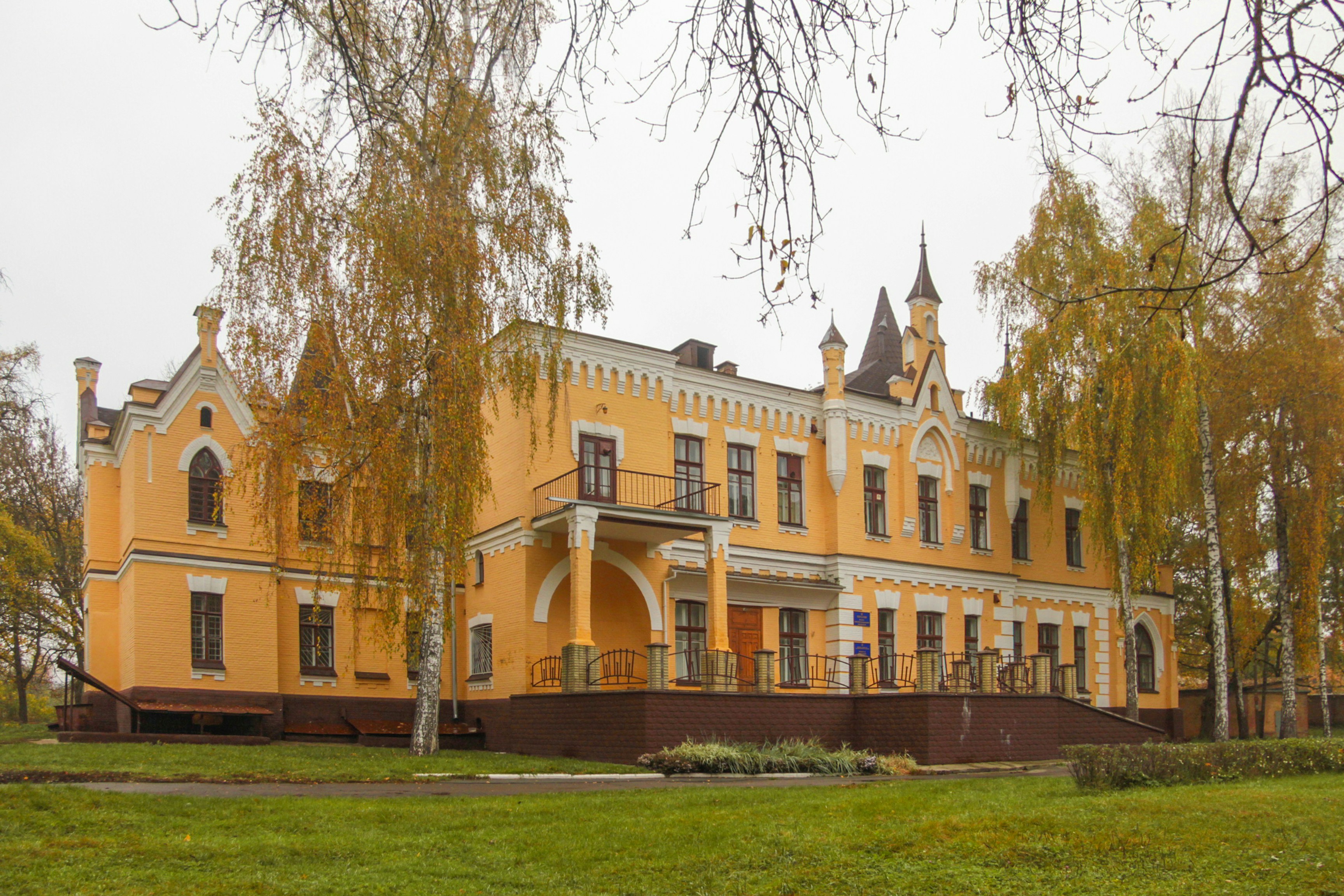 Sunlit Yellow Manor in Autumn Gleam