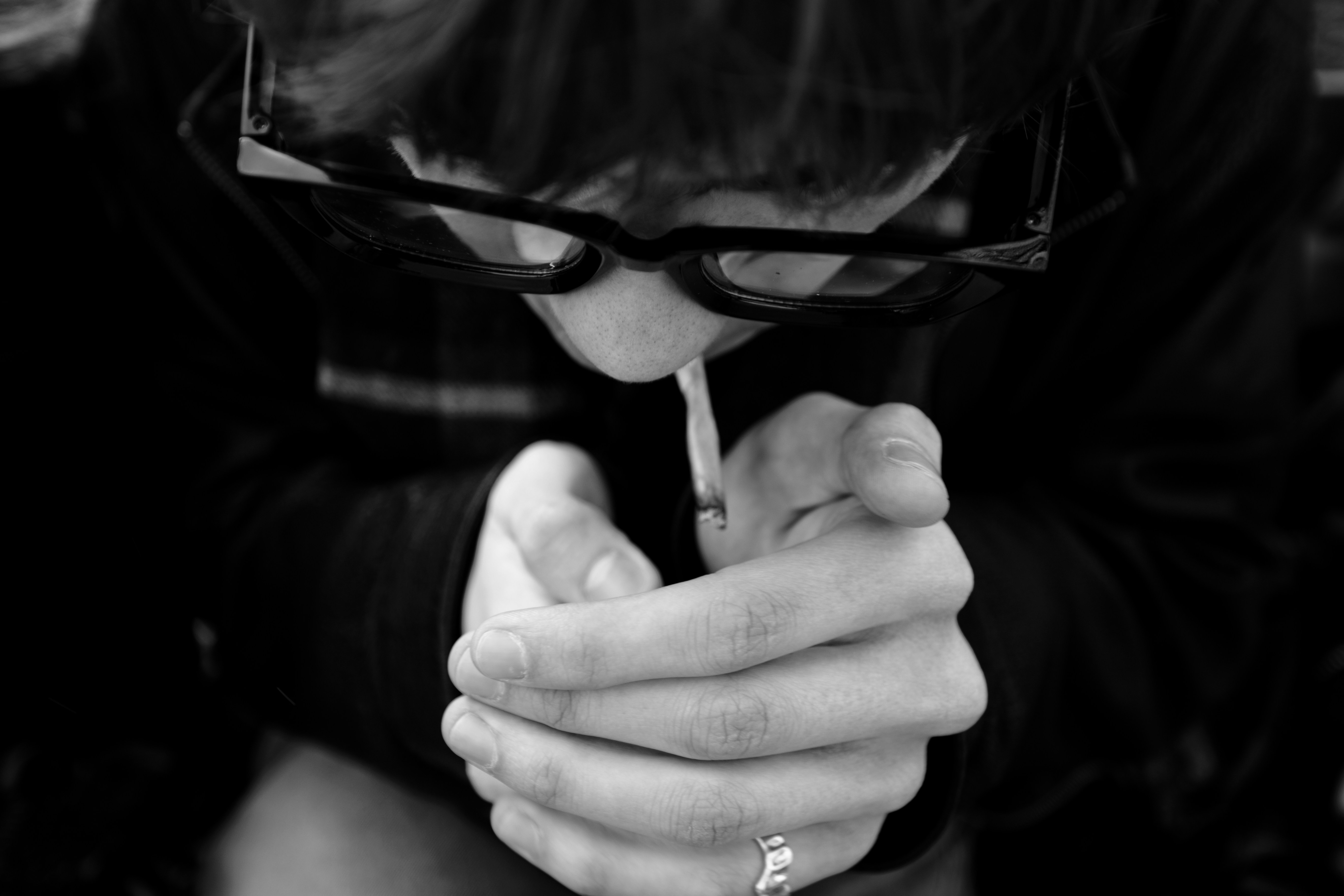 Hidden Focus: A Quiet Moment Through Glass and Shadow