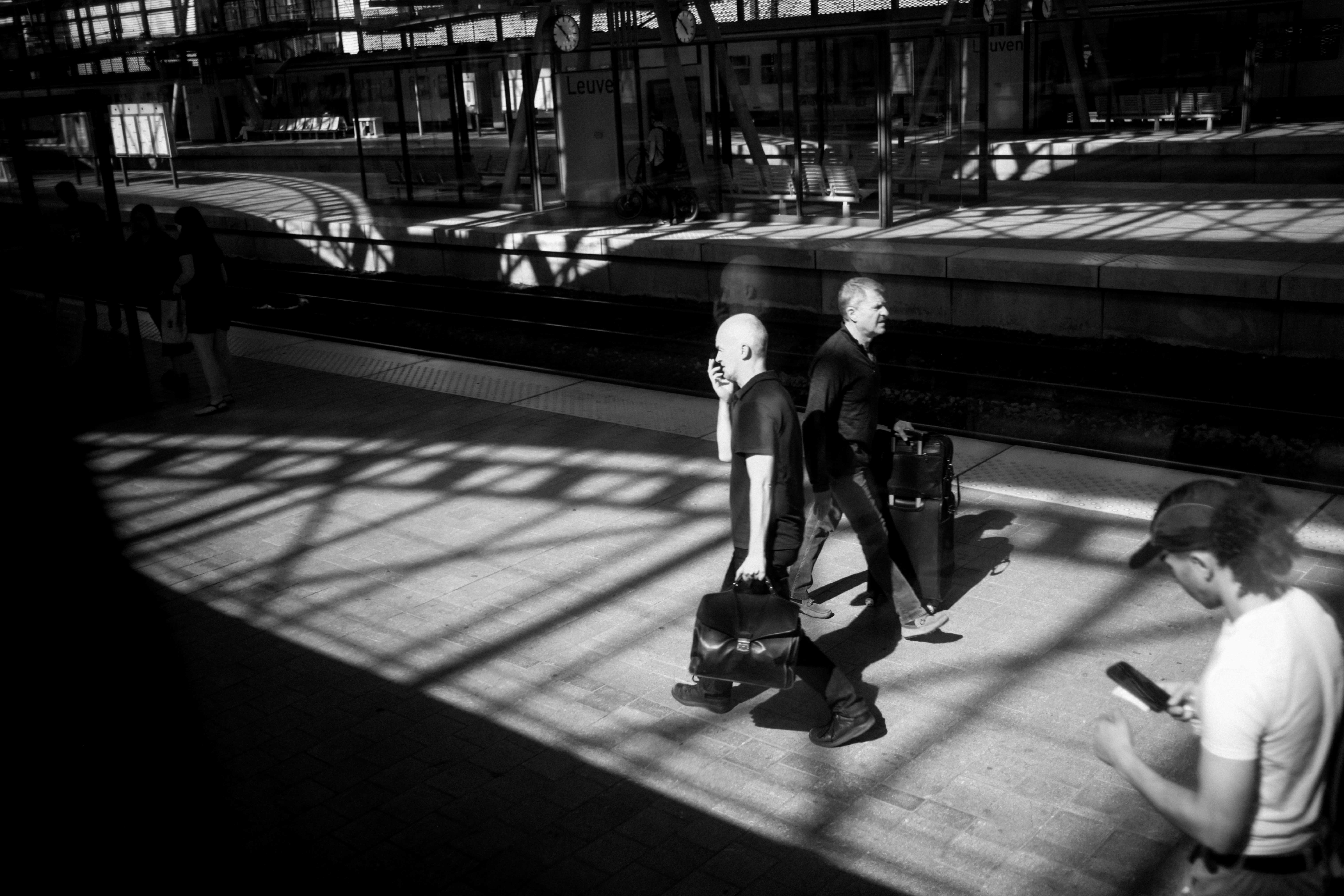 Transit Echoes: Striding Through Shadows at a Quiet Platform