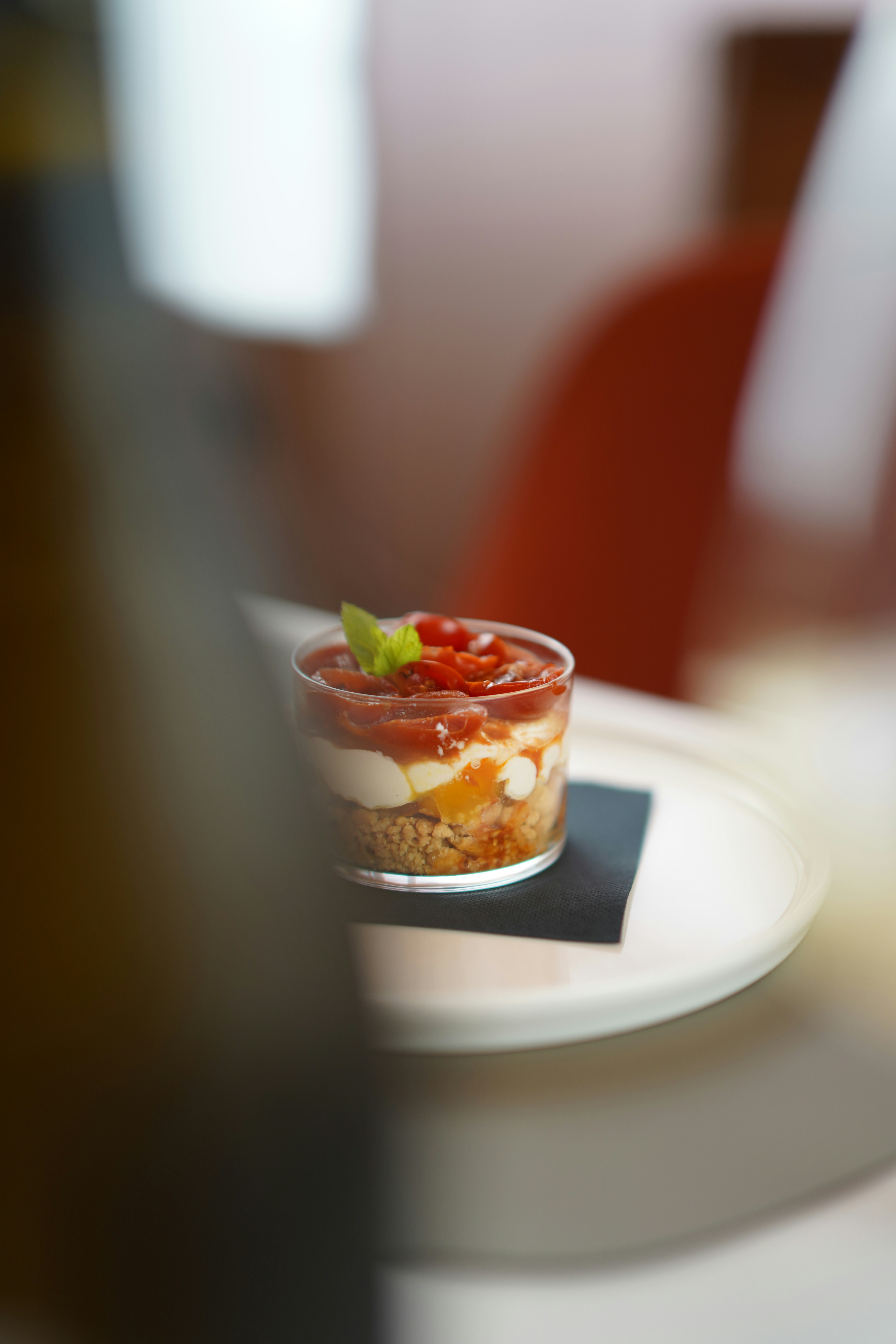 Dessert in Focus: A Glass Parfait on a Minimal Plate