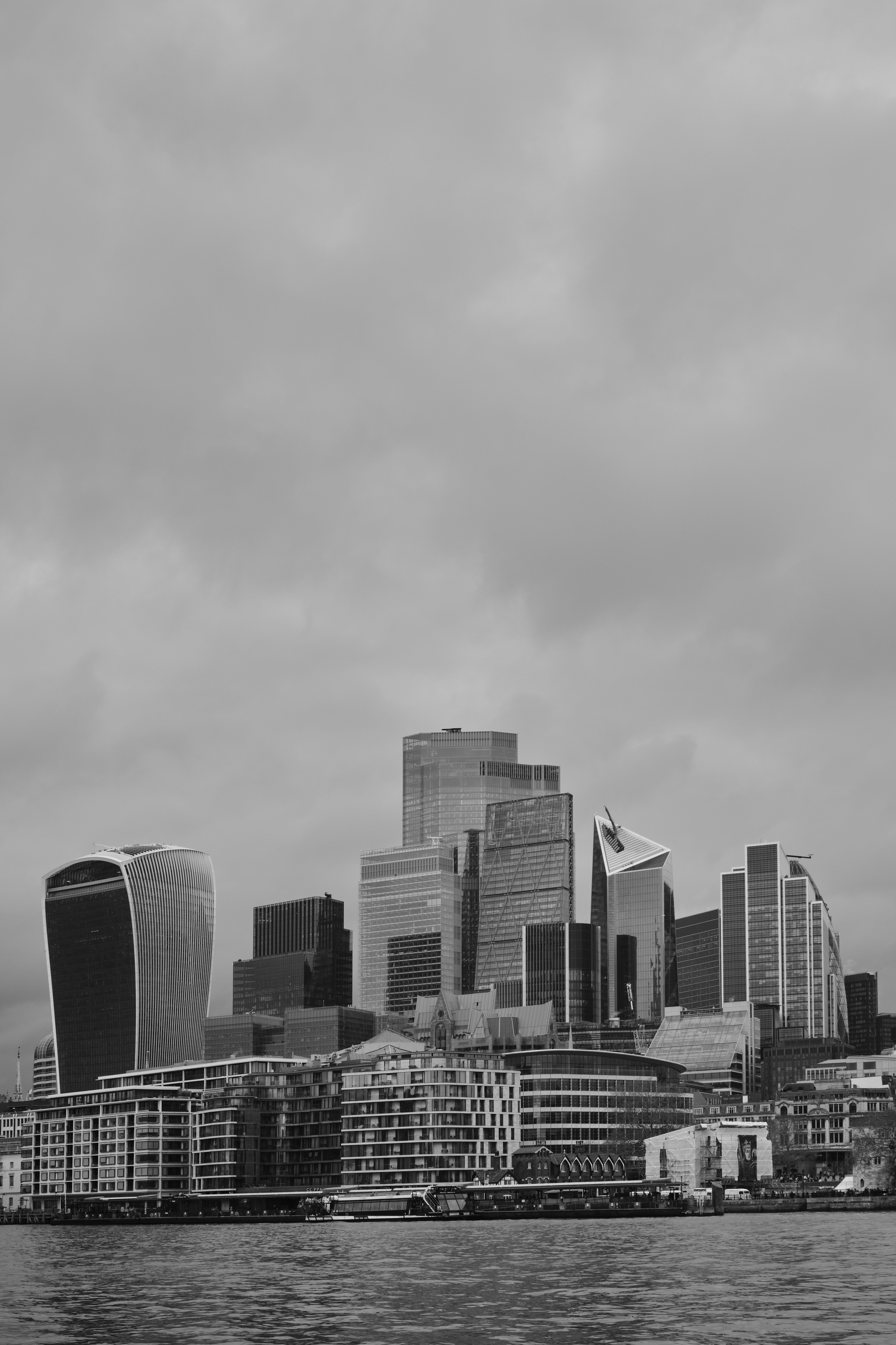 City by the River: Monochrome Skyline at Dusk