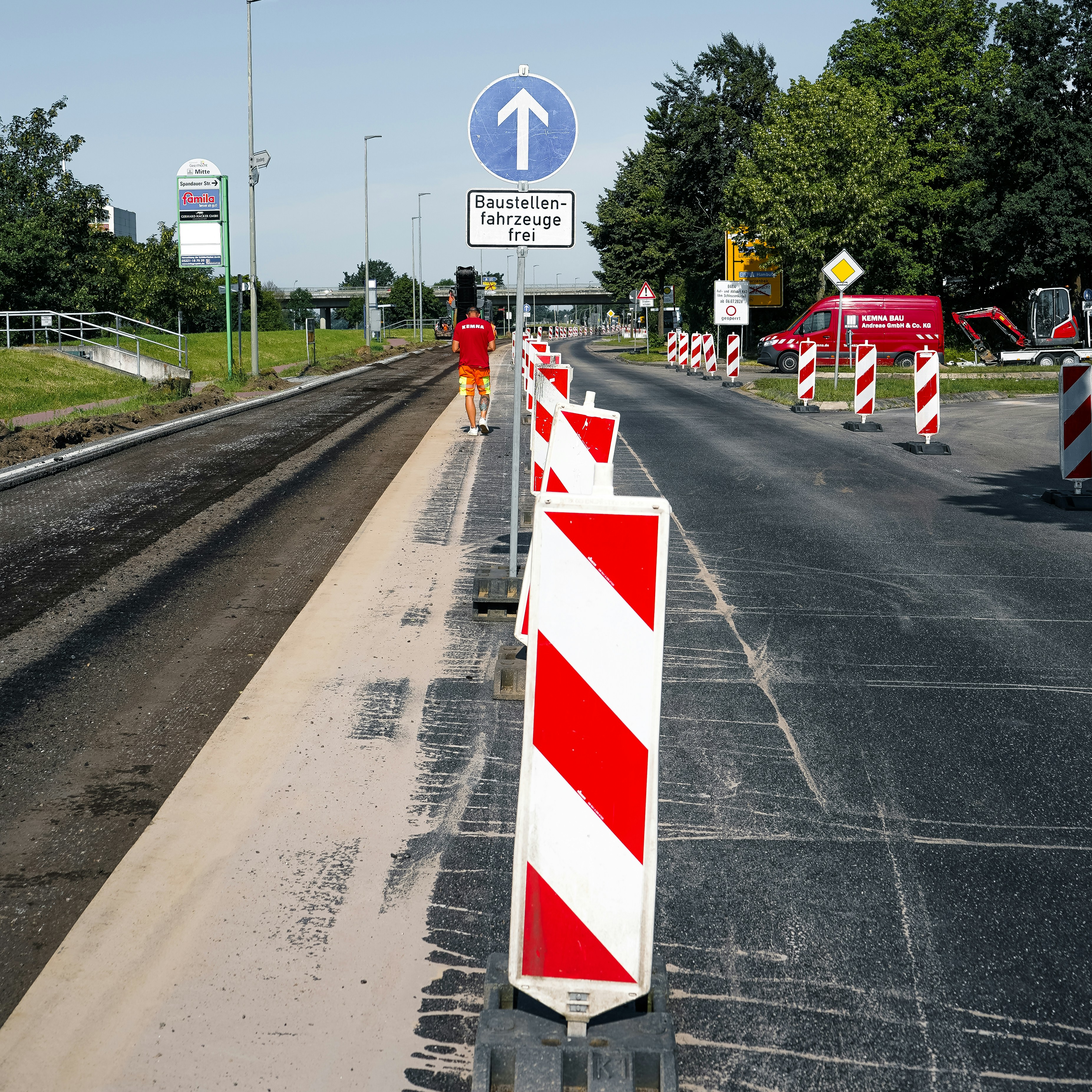 Crossing the Lane of Progress: Construction Kiosk and Arrow Barricade
