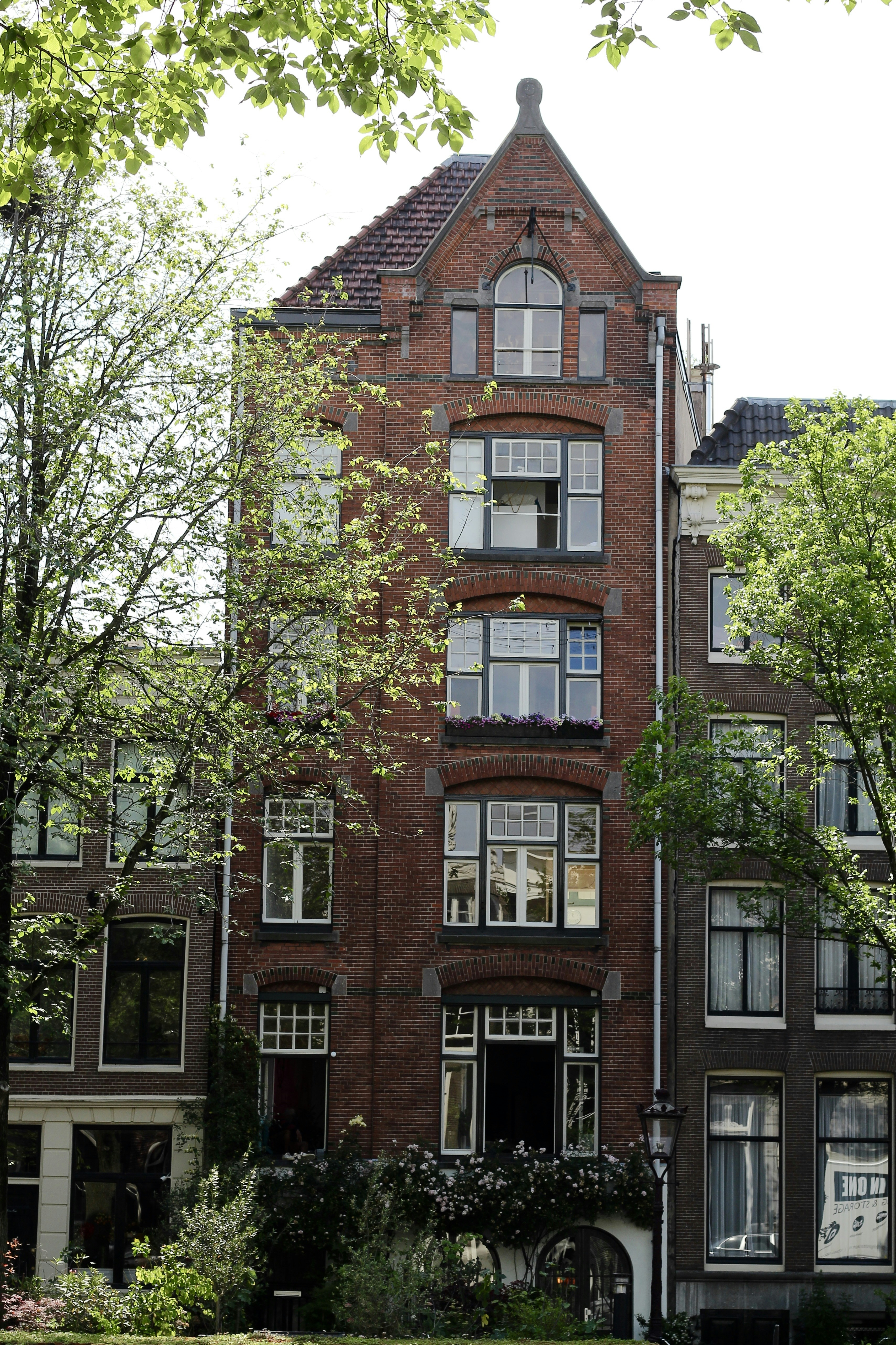Brick Townhouse in Blooming Canopy