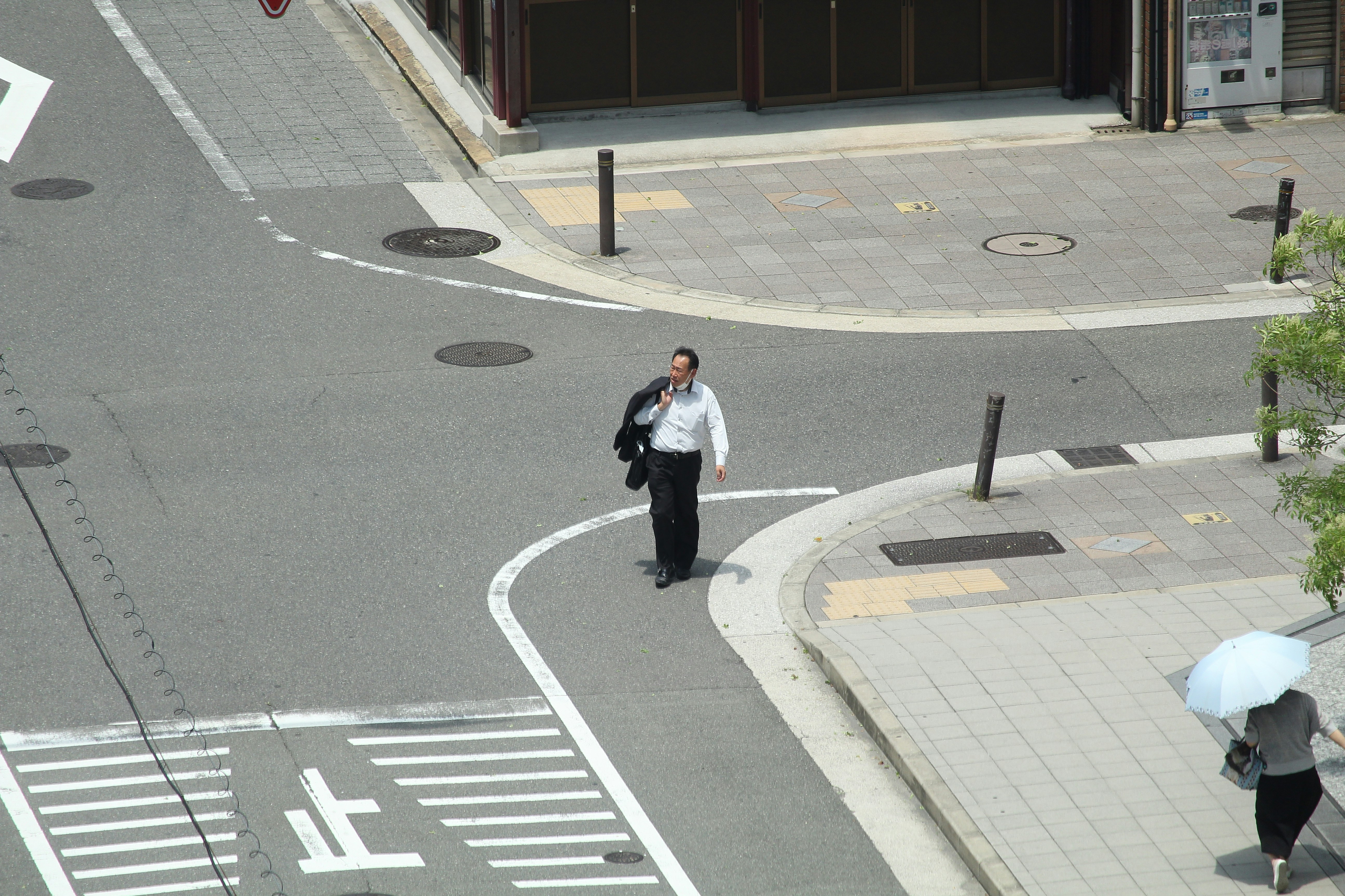 Crossing Boss: A City Worker Navigates a Quiet Corner