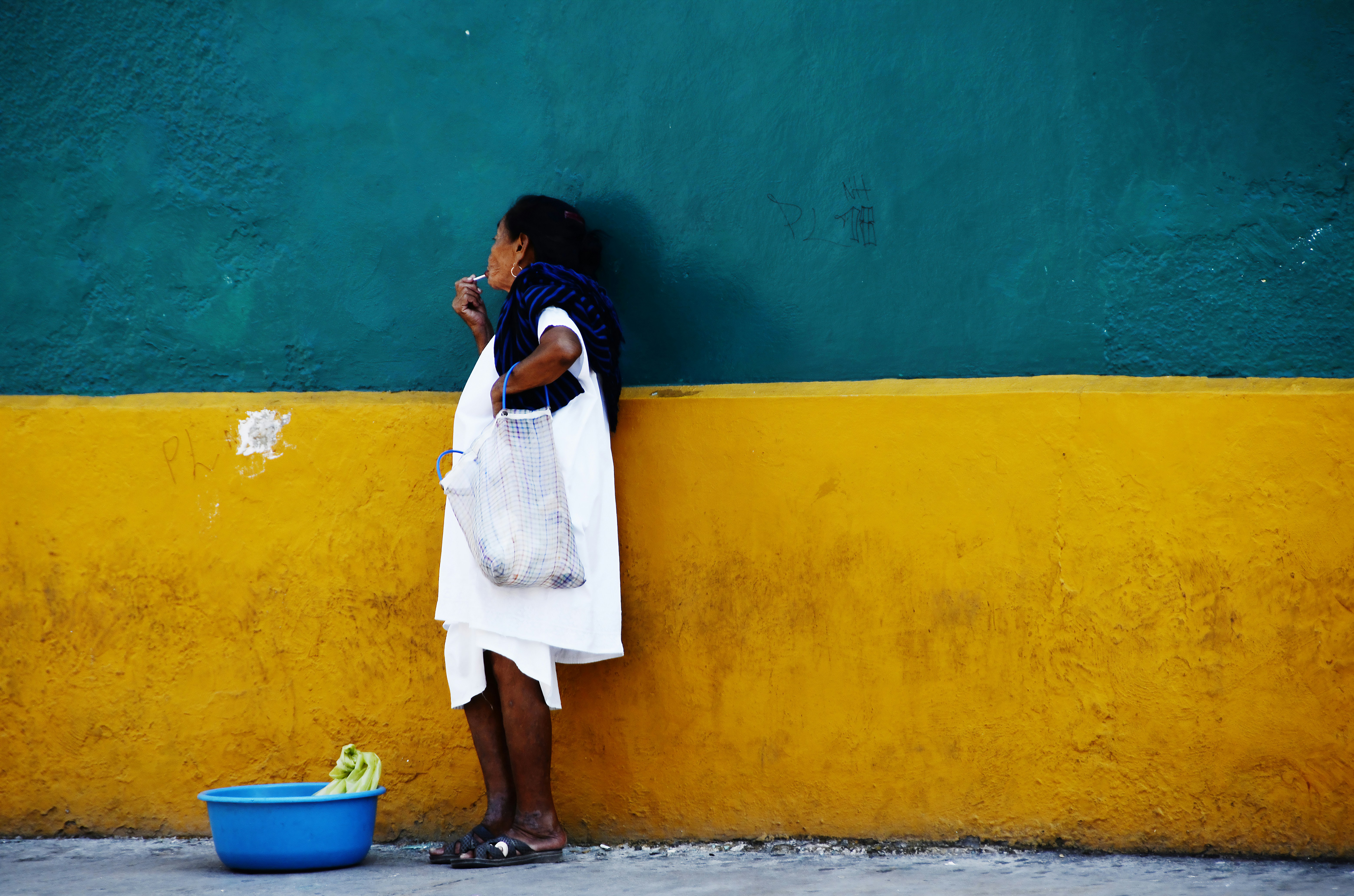 A Quiet Moment by the Painted Wall