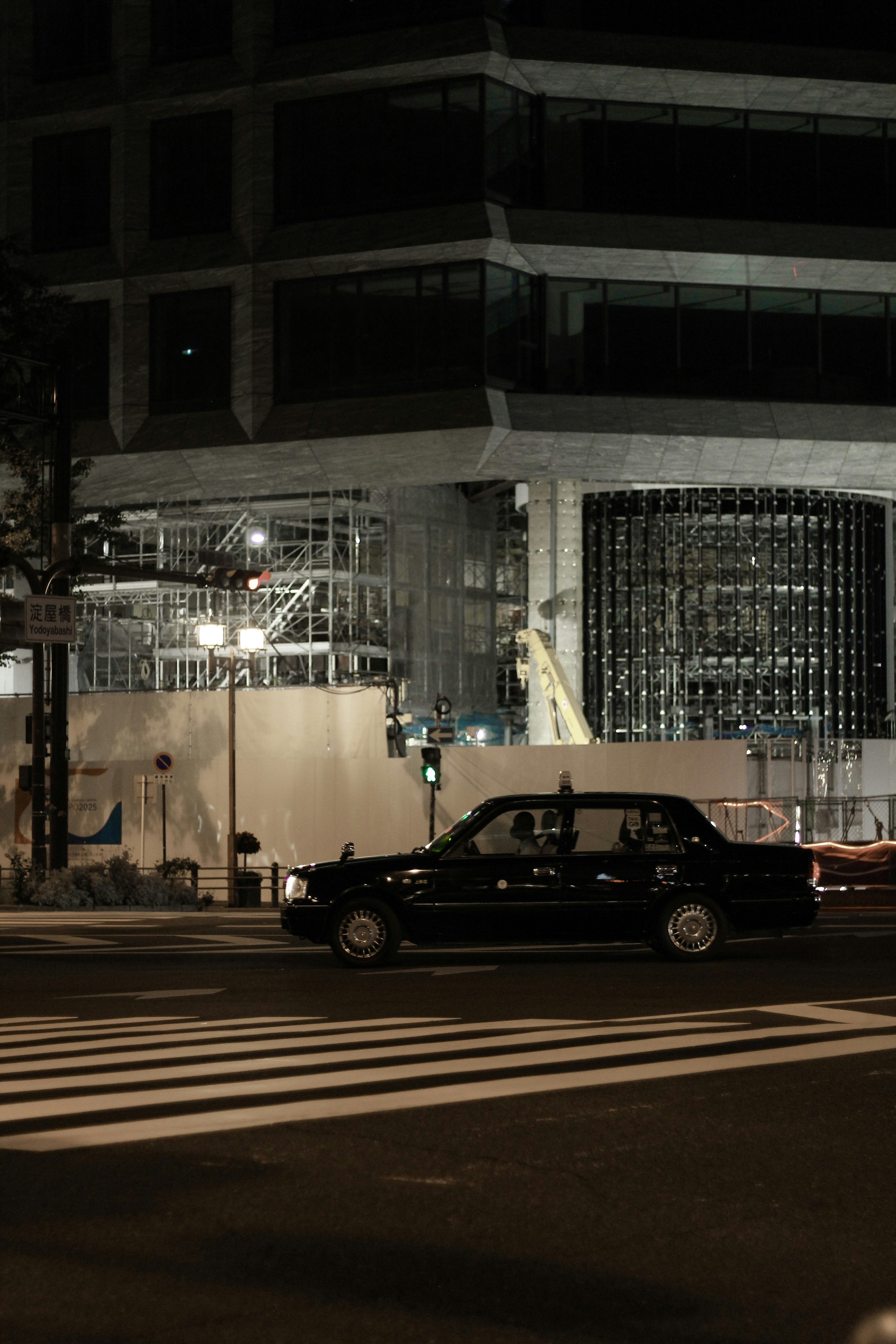 Midnight Cab at a Glassy Construction Wake