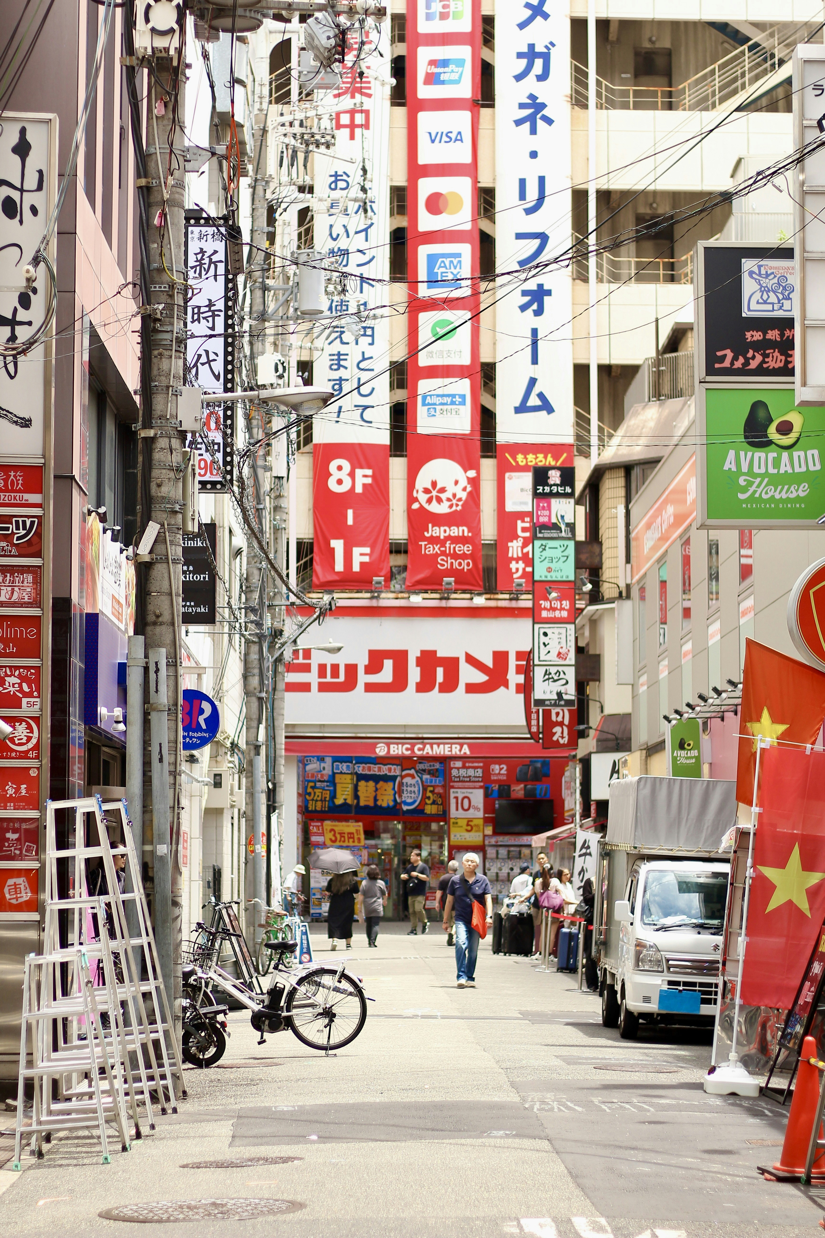 Neon Alleyway of Signals: A Bustling Tokyo Street Corridor