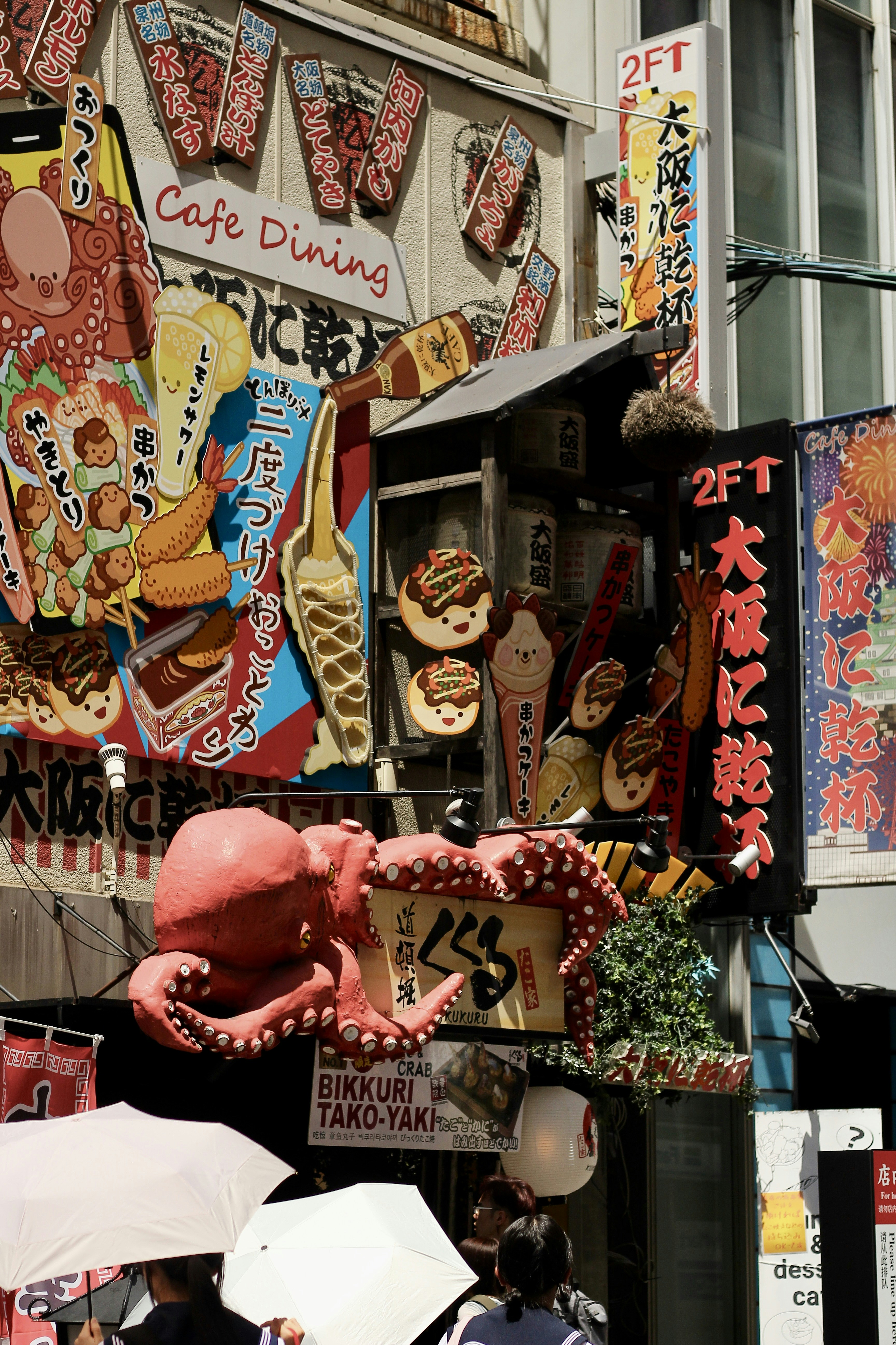 Crab Signage and Neon Palettes Above a Bustling Japanese Alley