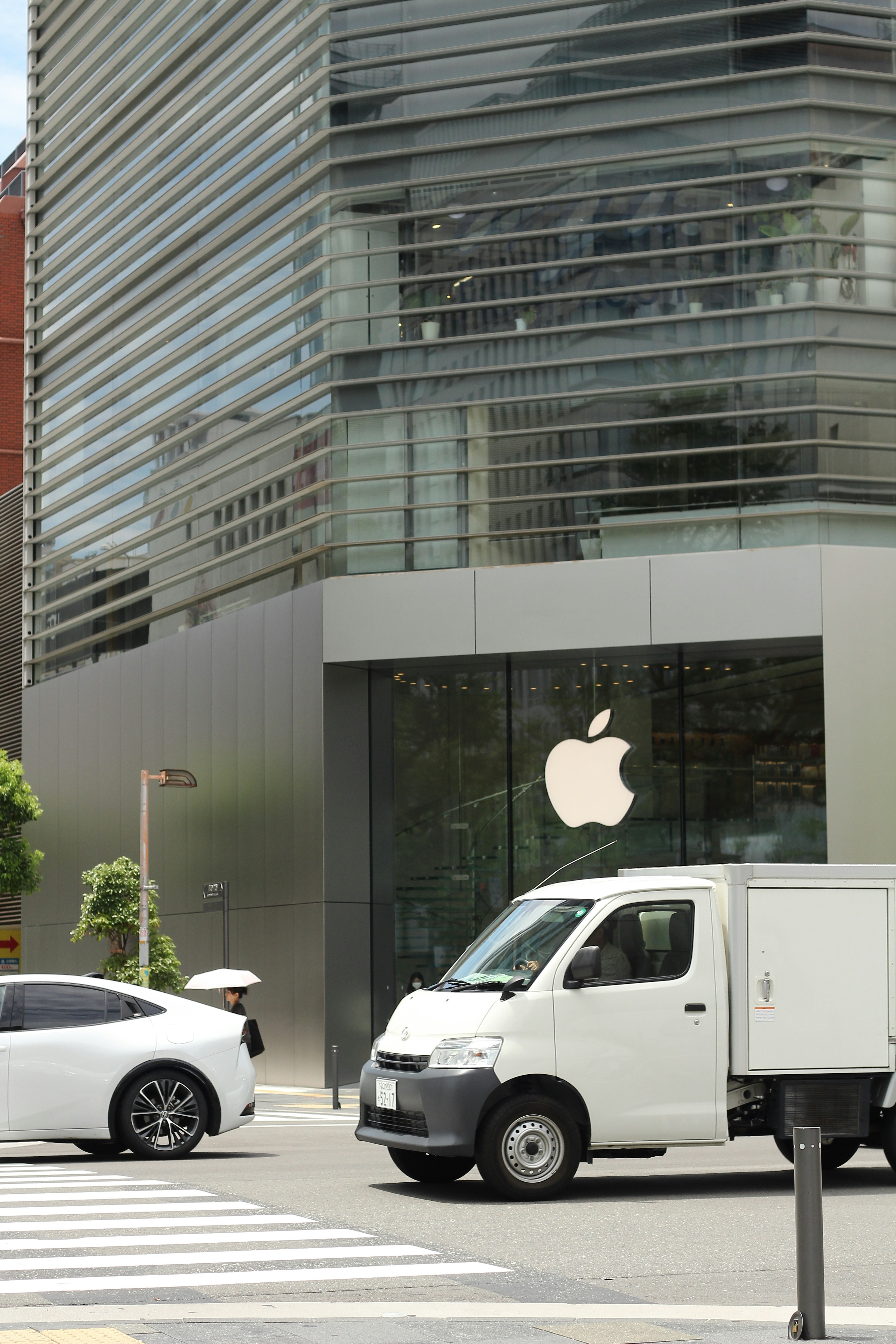 Apple Store Facade Beneath Urban Glass