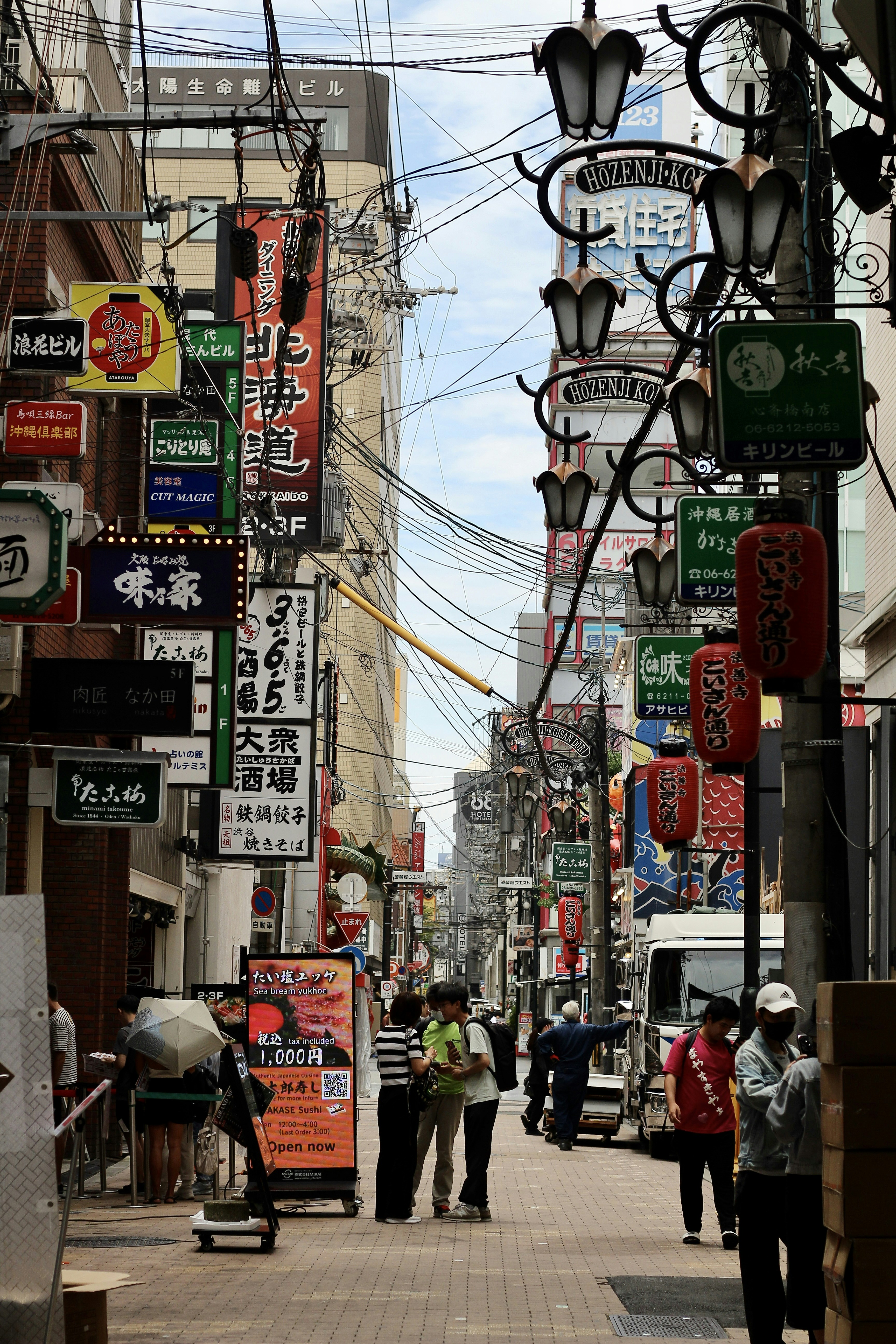 Neon Alleyways: A Tangle of Signs and Pedestrians