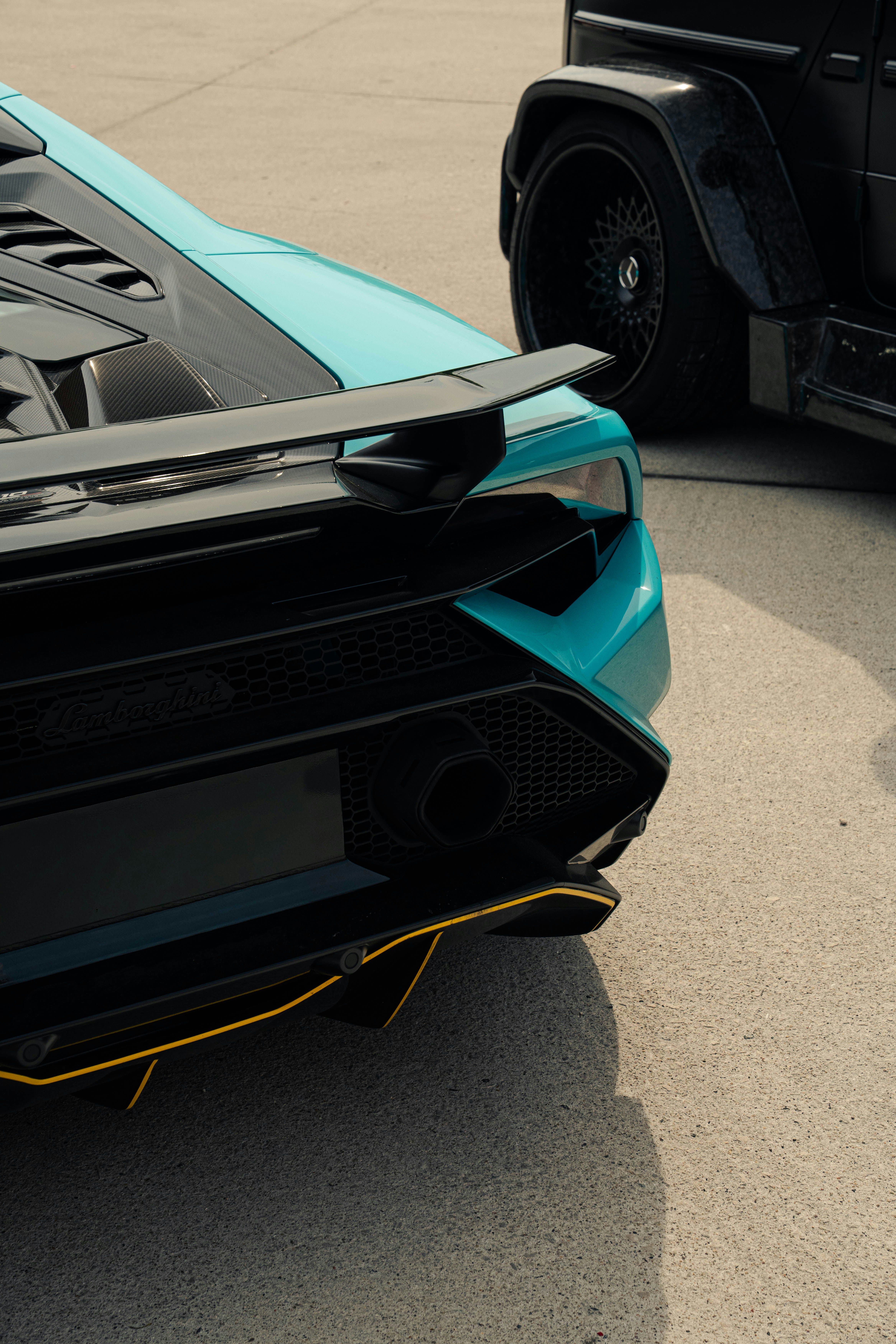 Teal Front Bumper Duel: Precision Steel Meets Street Shadow