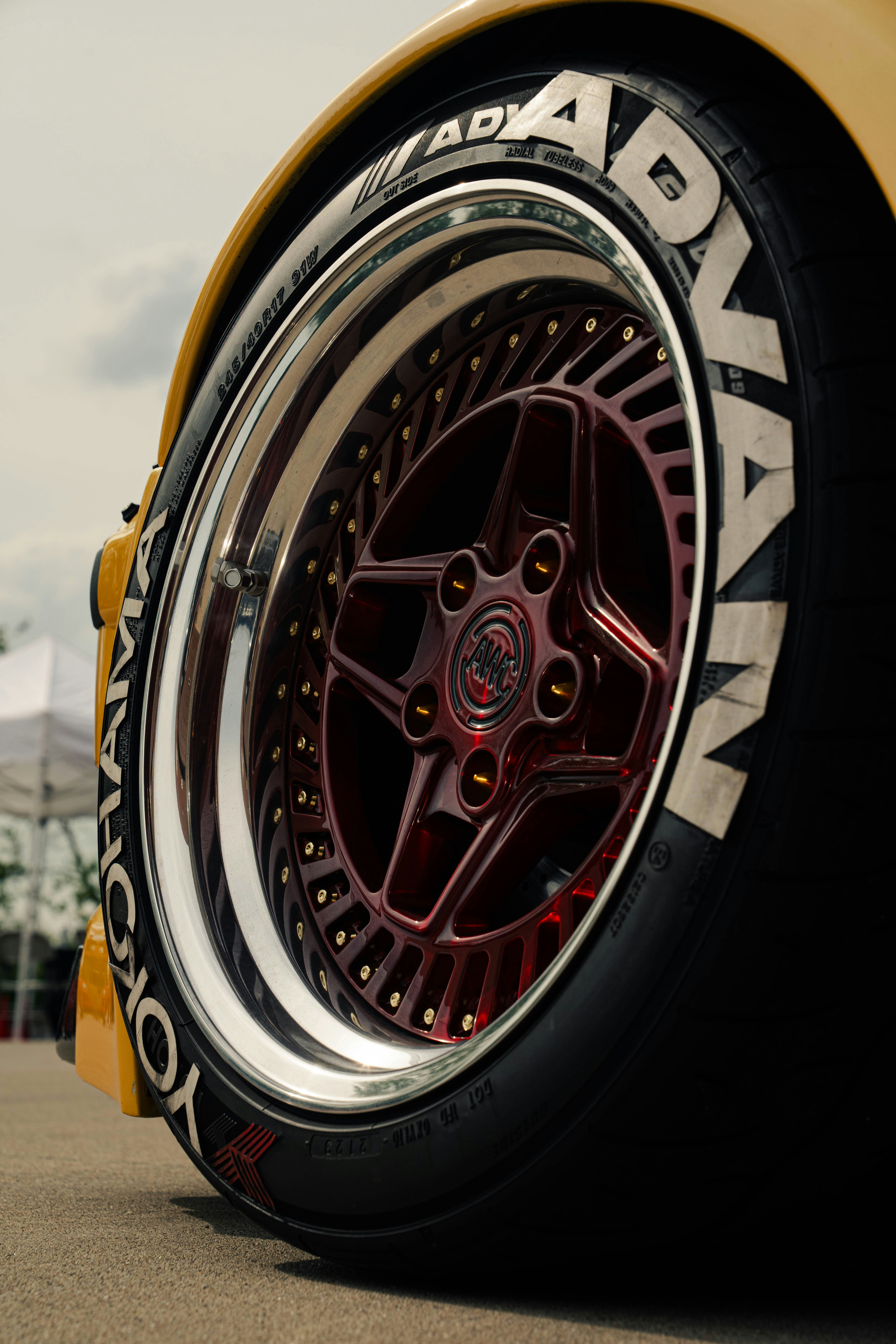 Steel and Dawn: A Close-Up of a Racing Wheel