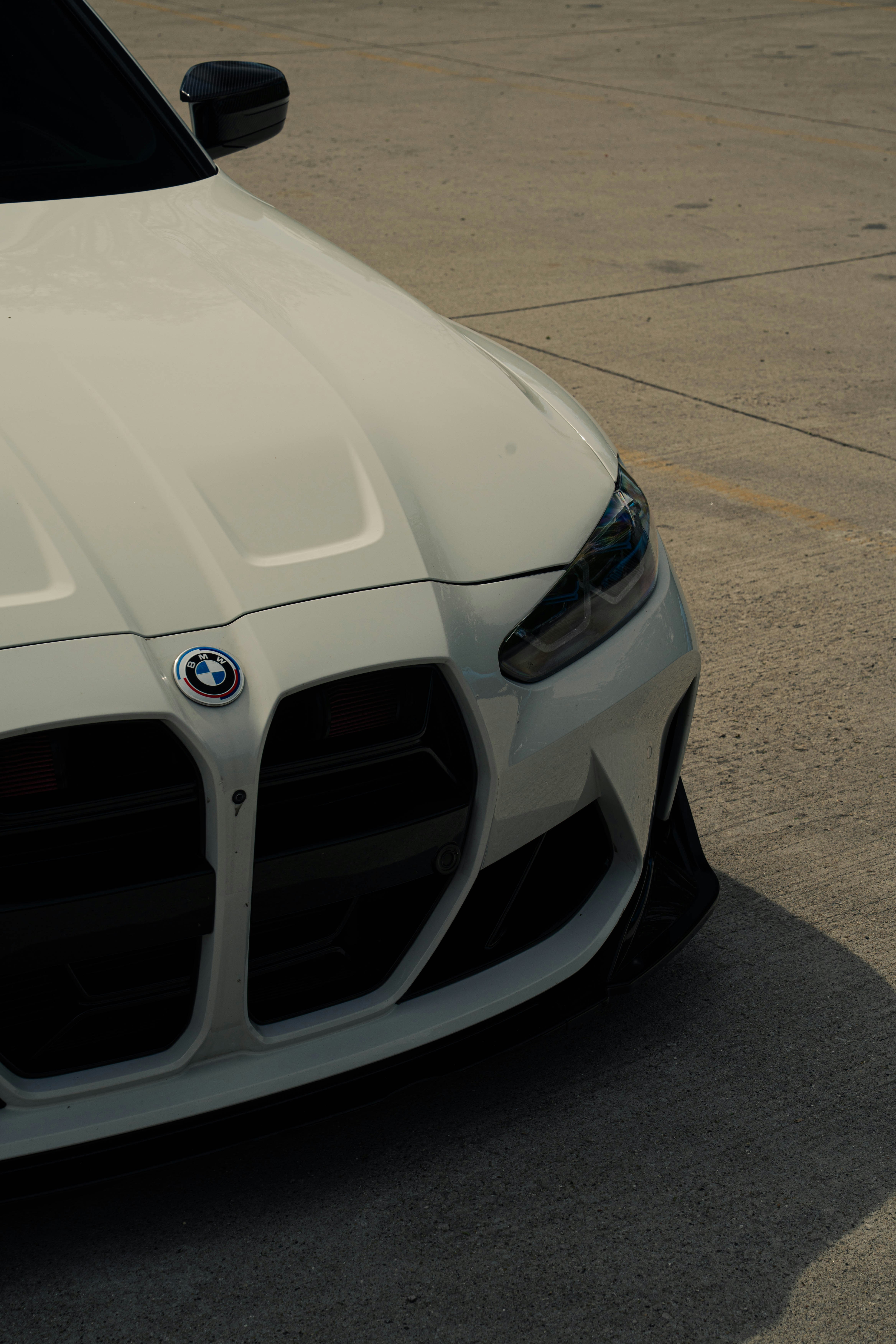 Front-Quarter Majesty: BMW-esque Grip on a White M-Package Contour