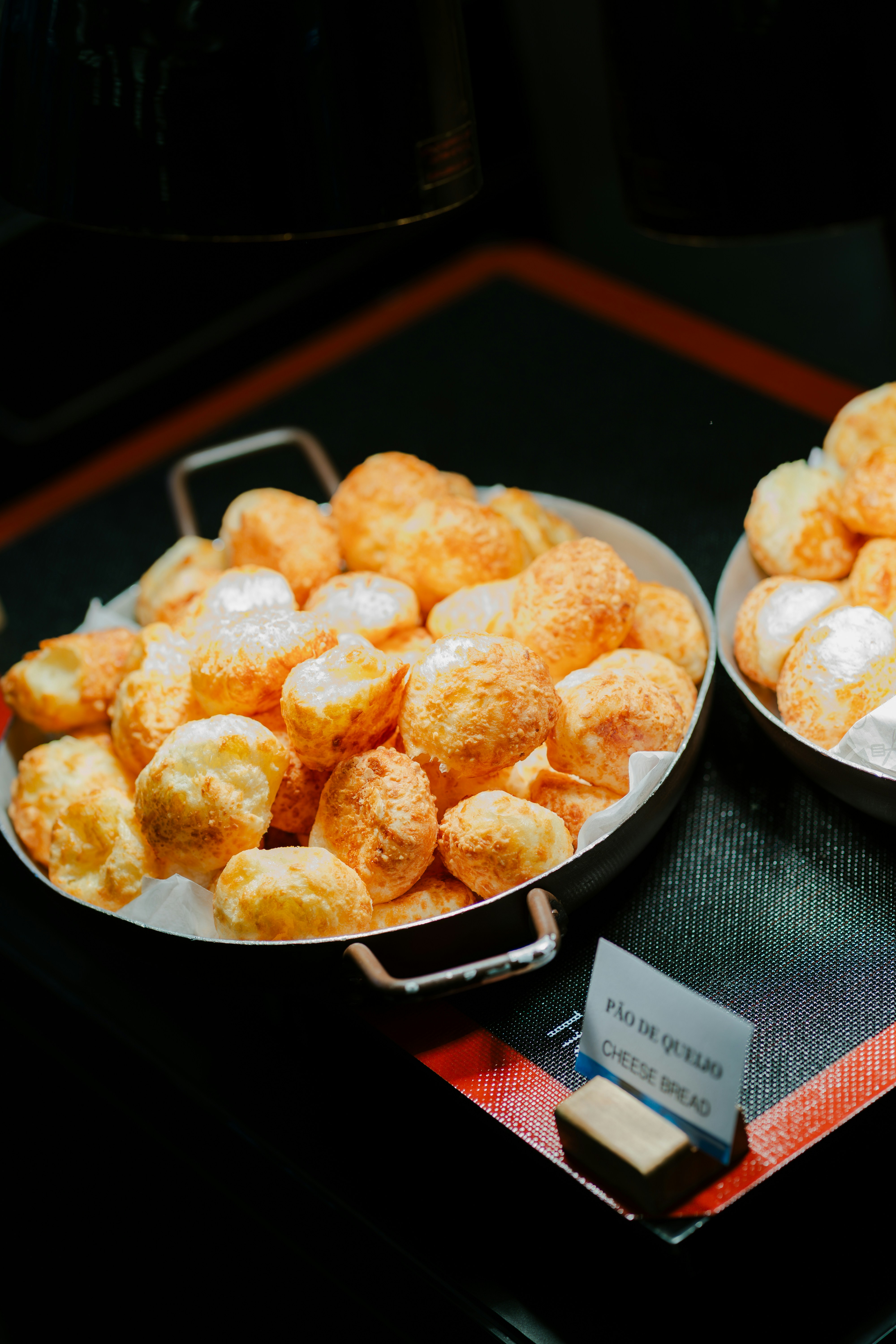 Sesame Cloud Pastries: Golden Chevre morsels in a velvet banquet