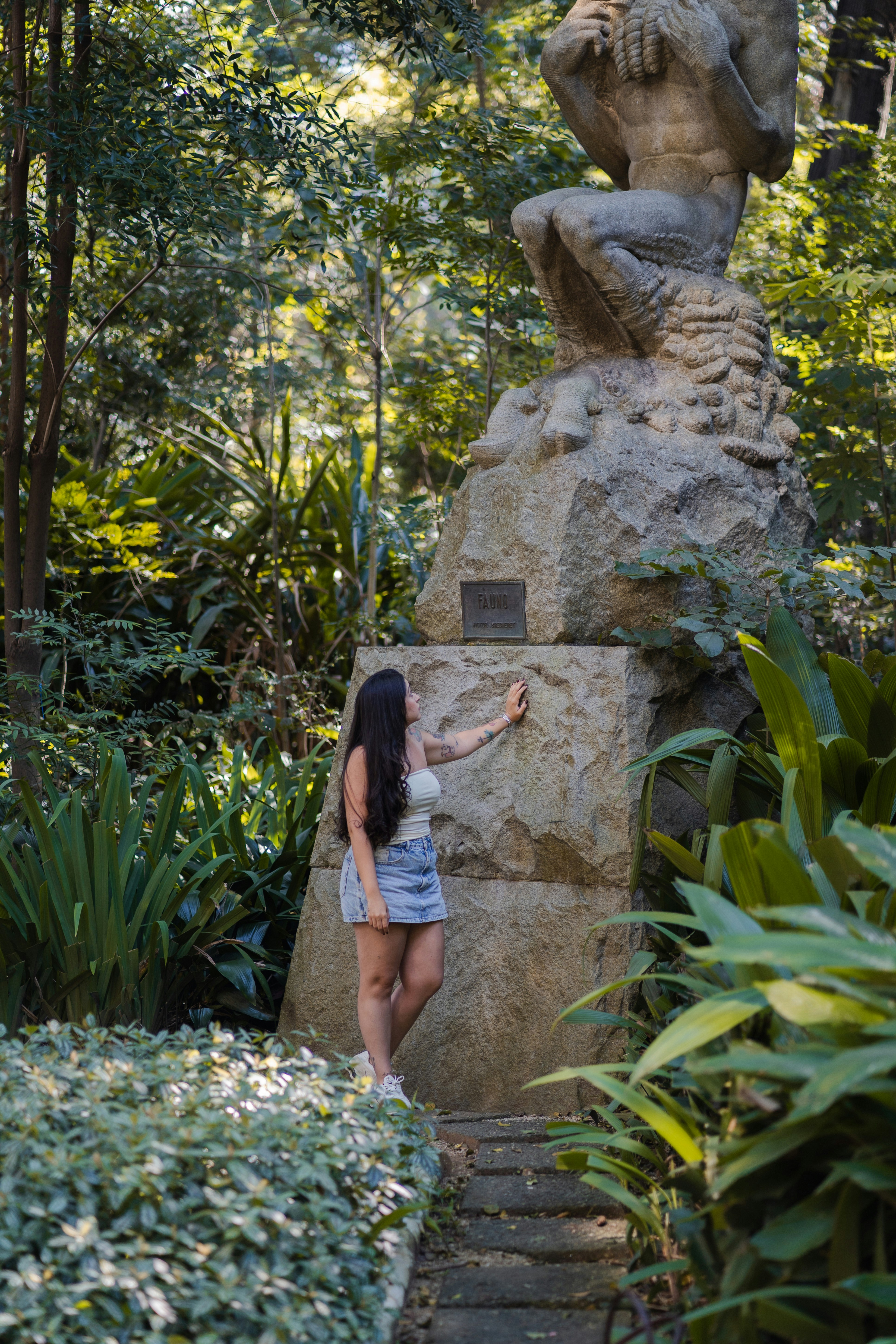 Whispered Curiosity: A Moment with the statue