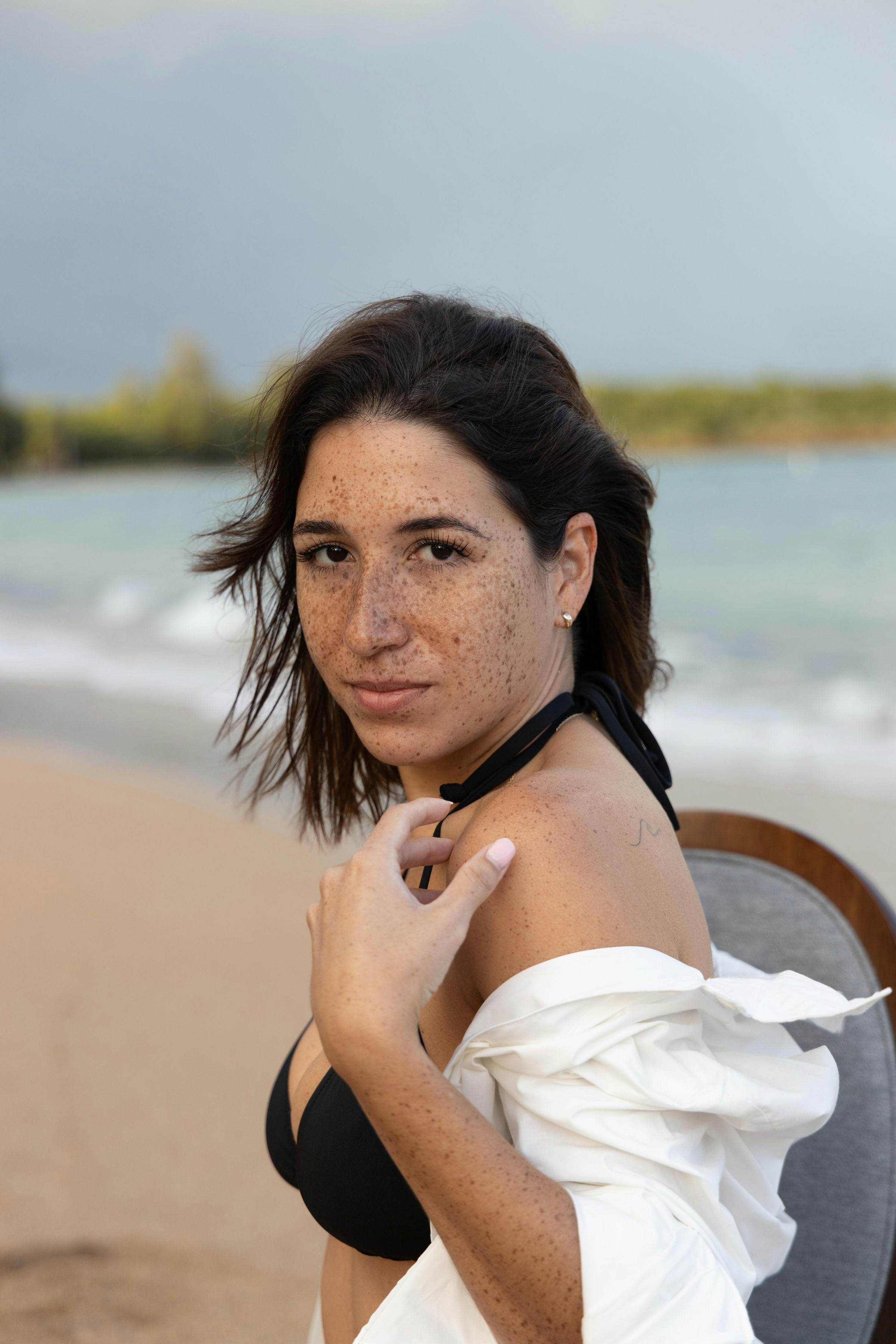 Sunlit Freckles and Sea Breeze: Portrait on the Shore