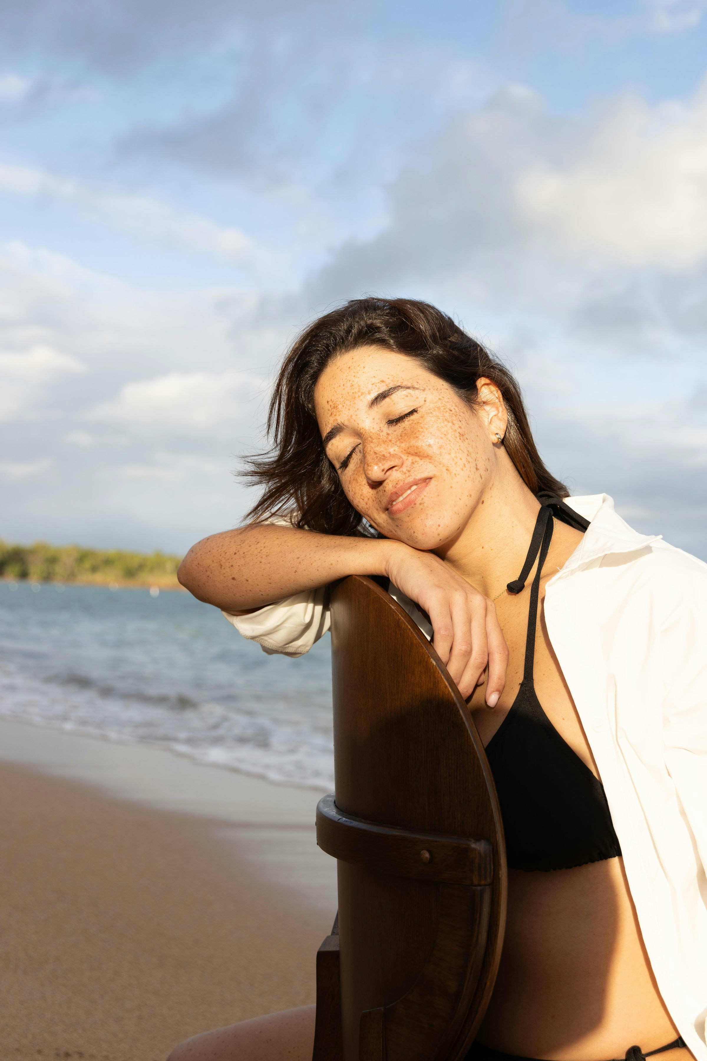 Sunlit Solace: A Beach Portrait in Warm Light