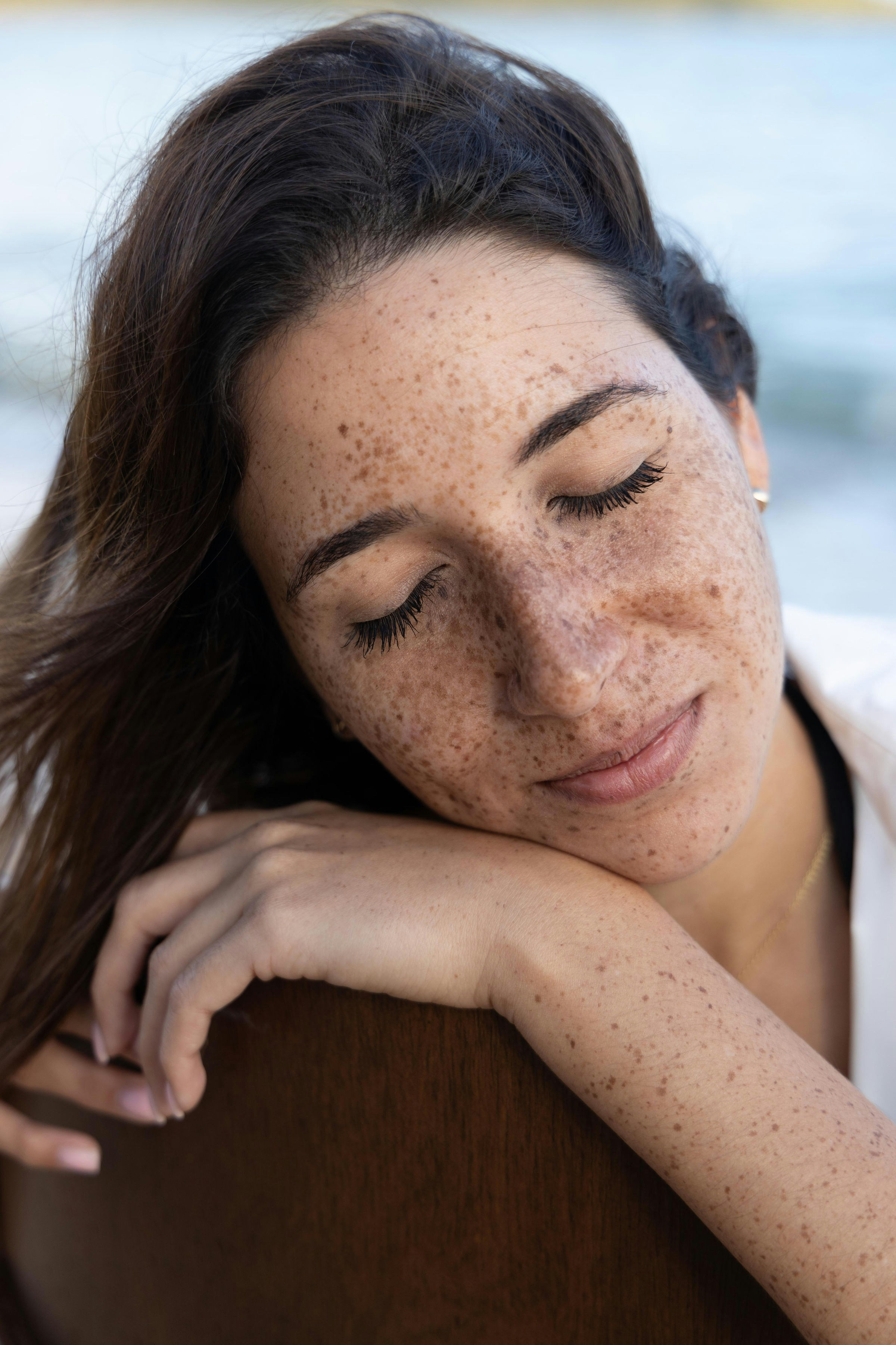 Quiet Contemplation by the Sea: Freckled Glow