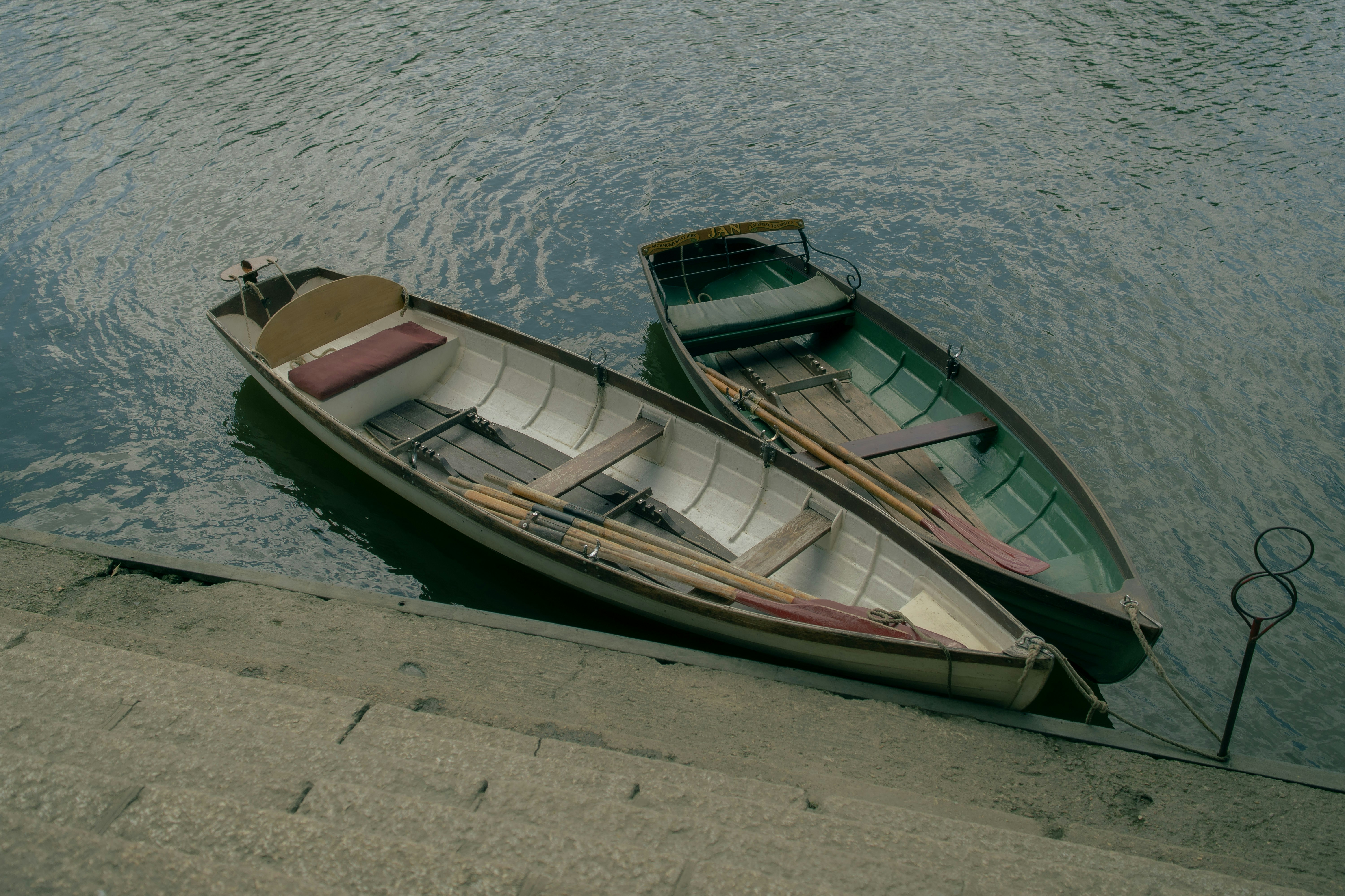 Two Alleys of Color: Boats Docked Along a Quiet Shore