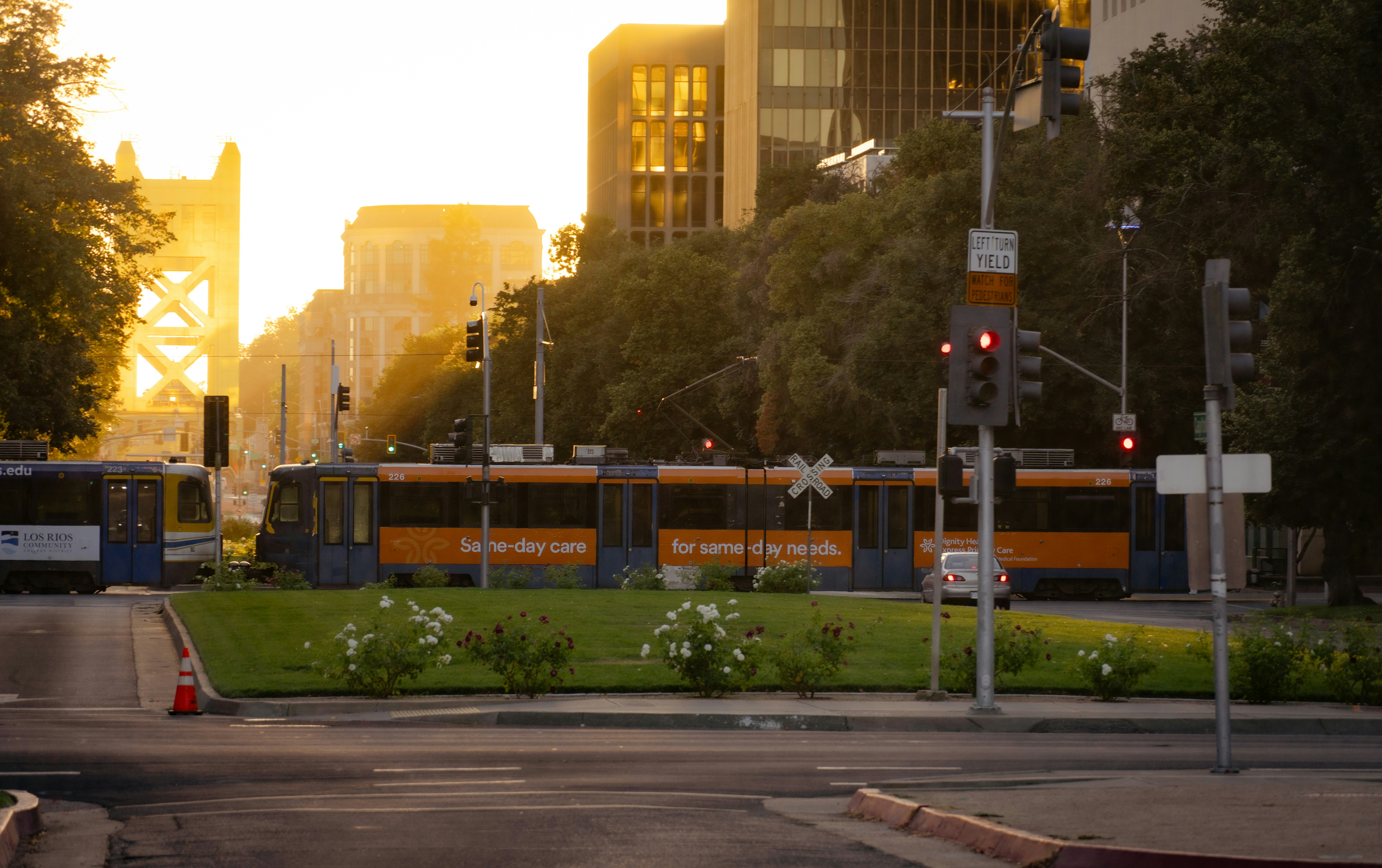 Golden Hour Crossing: Trains, Tracks, and Traffic Lights