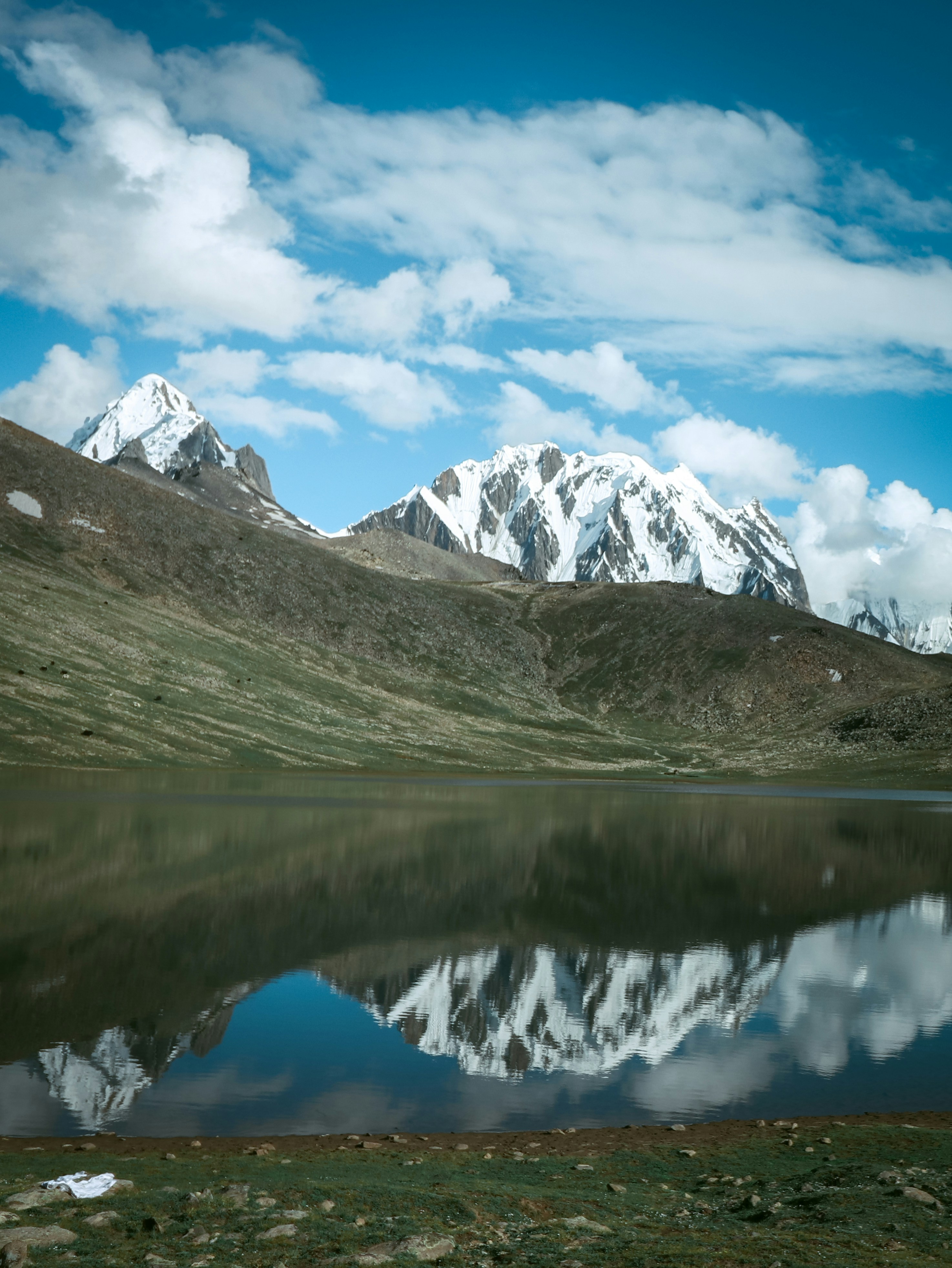 Snowbound Peaks Reflect in a Quiet Alpine Lake