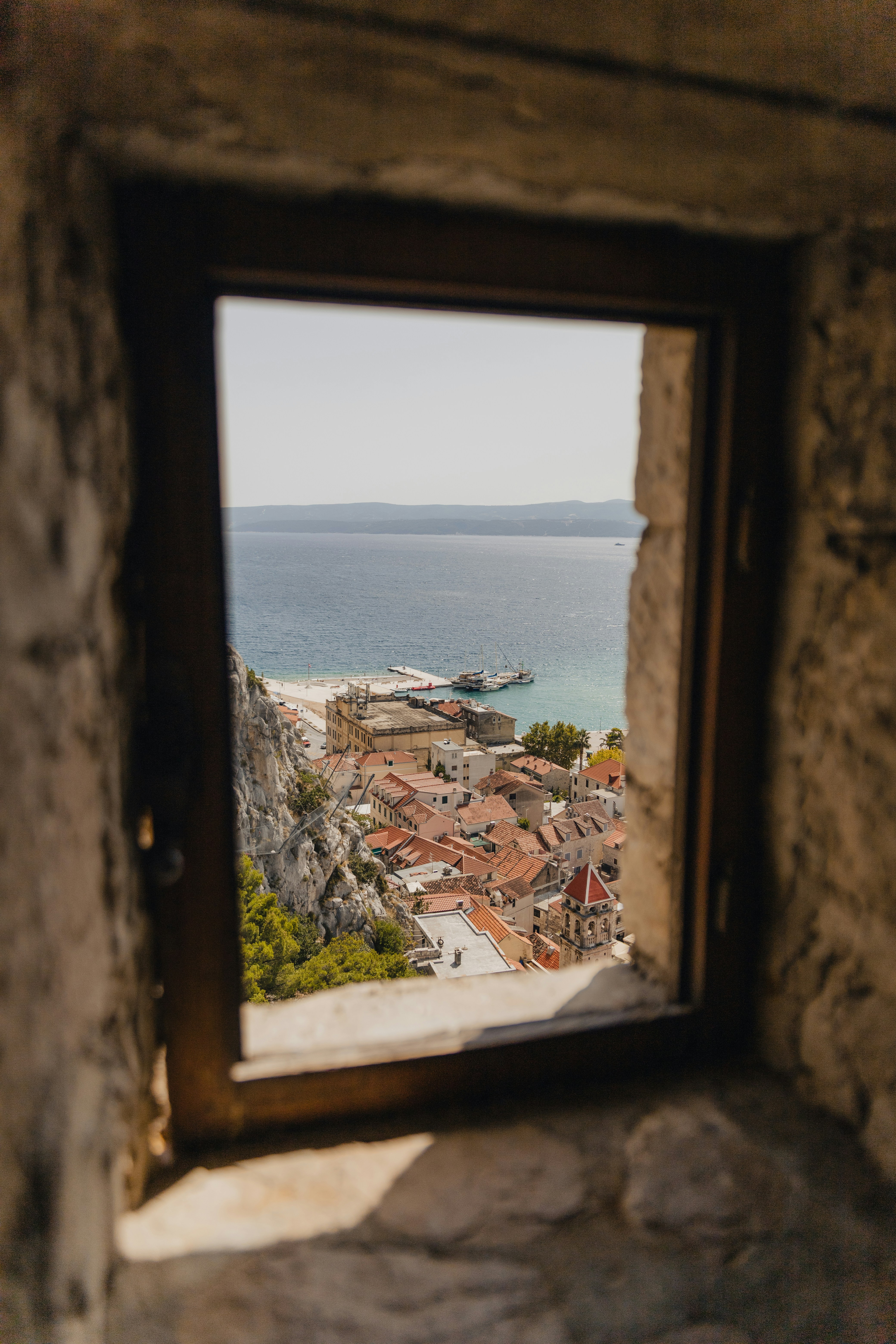 A Castle Window to the Adriatic: Coastal Village Framed by Stone