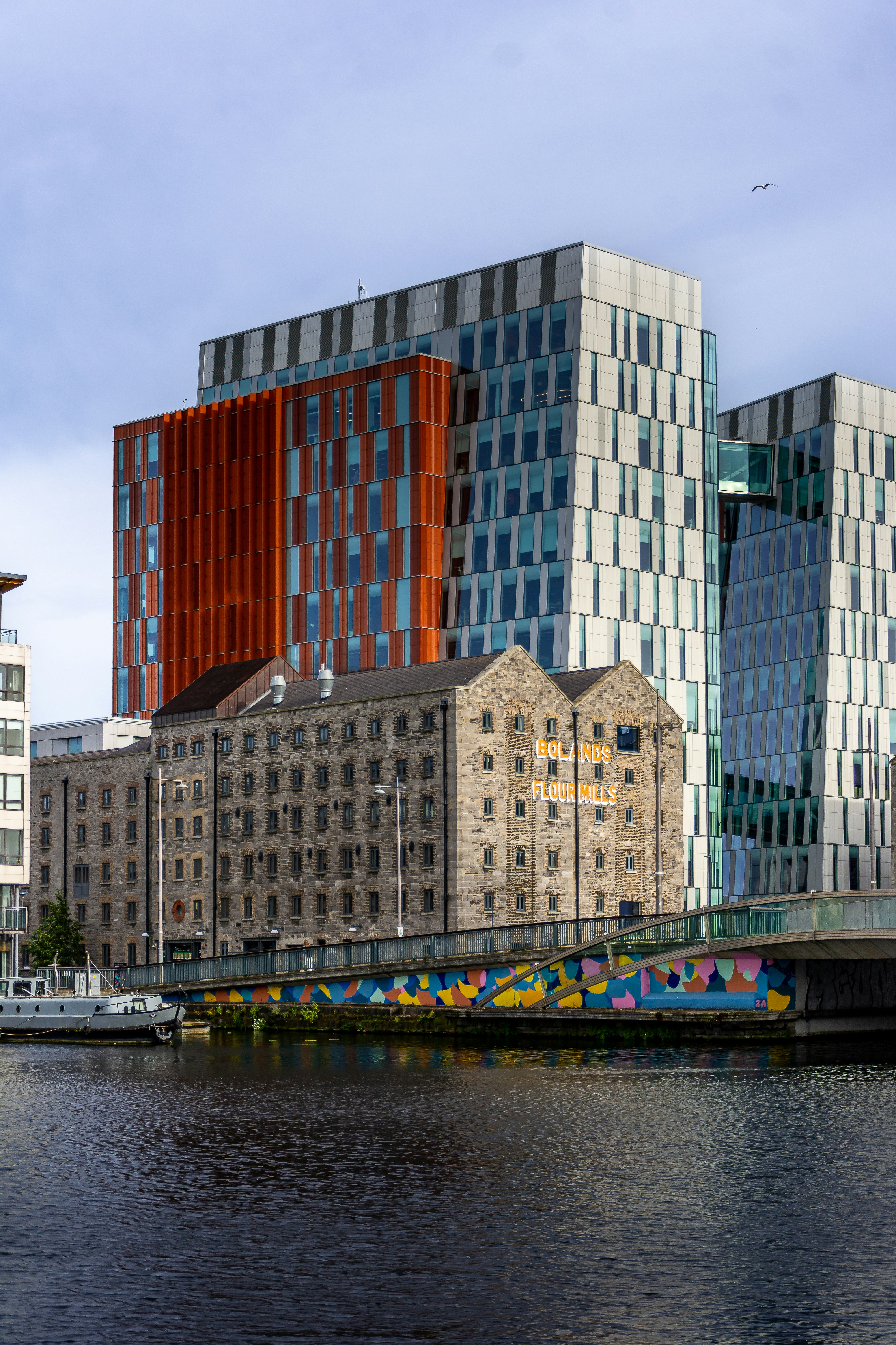City by the River: Modern Glass Meets Historic Brick