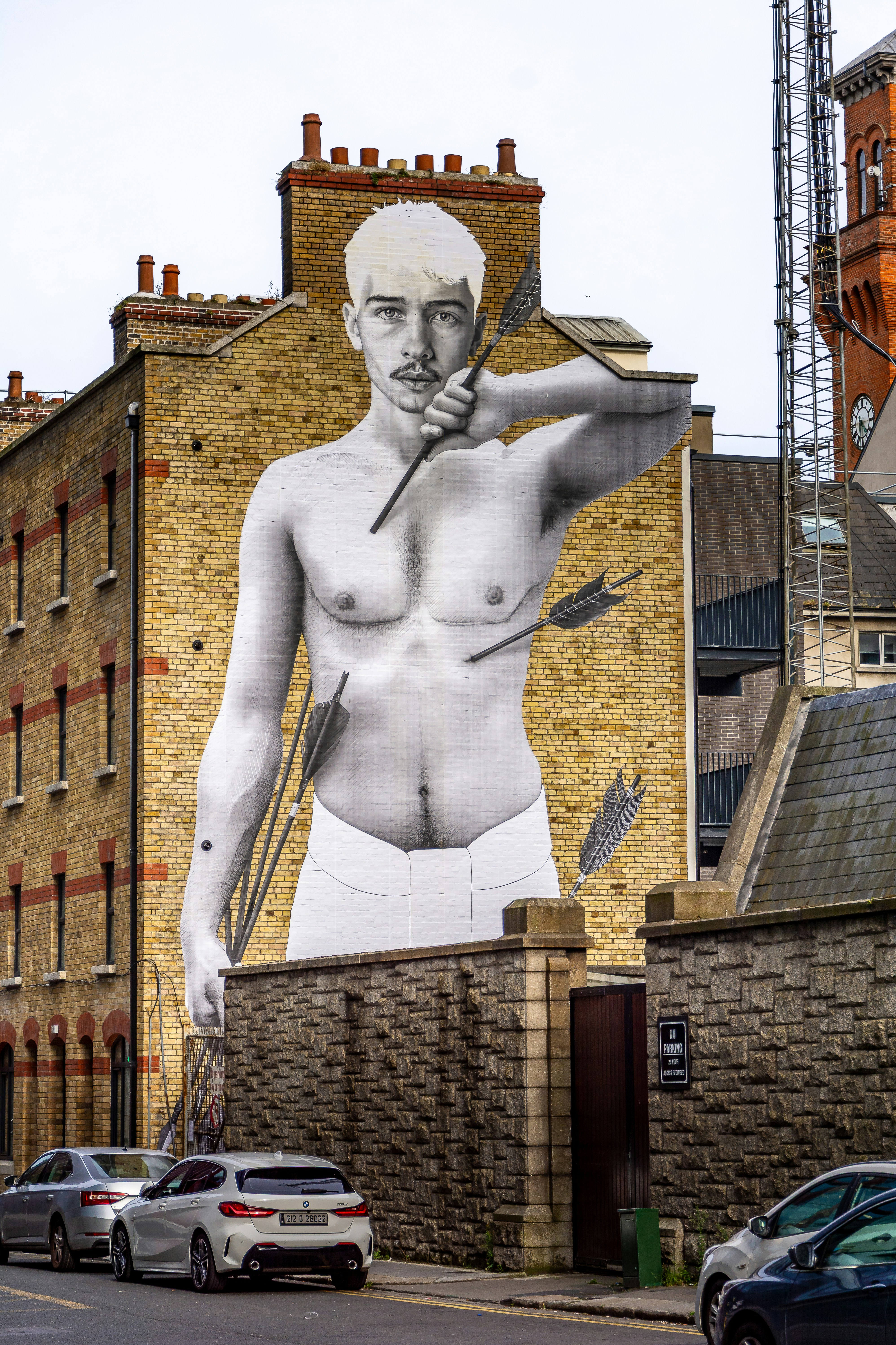 Arrow of Focus: A Giant Graffiti Portrait Anchored to Brick