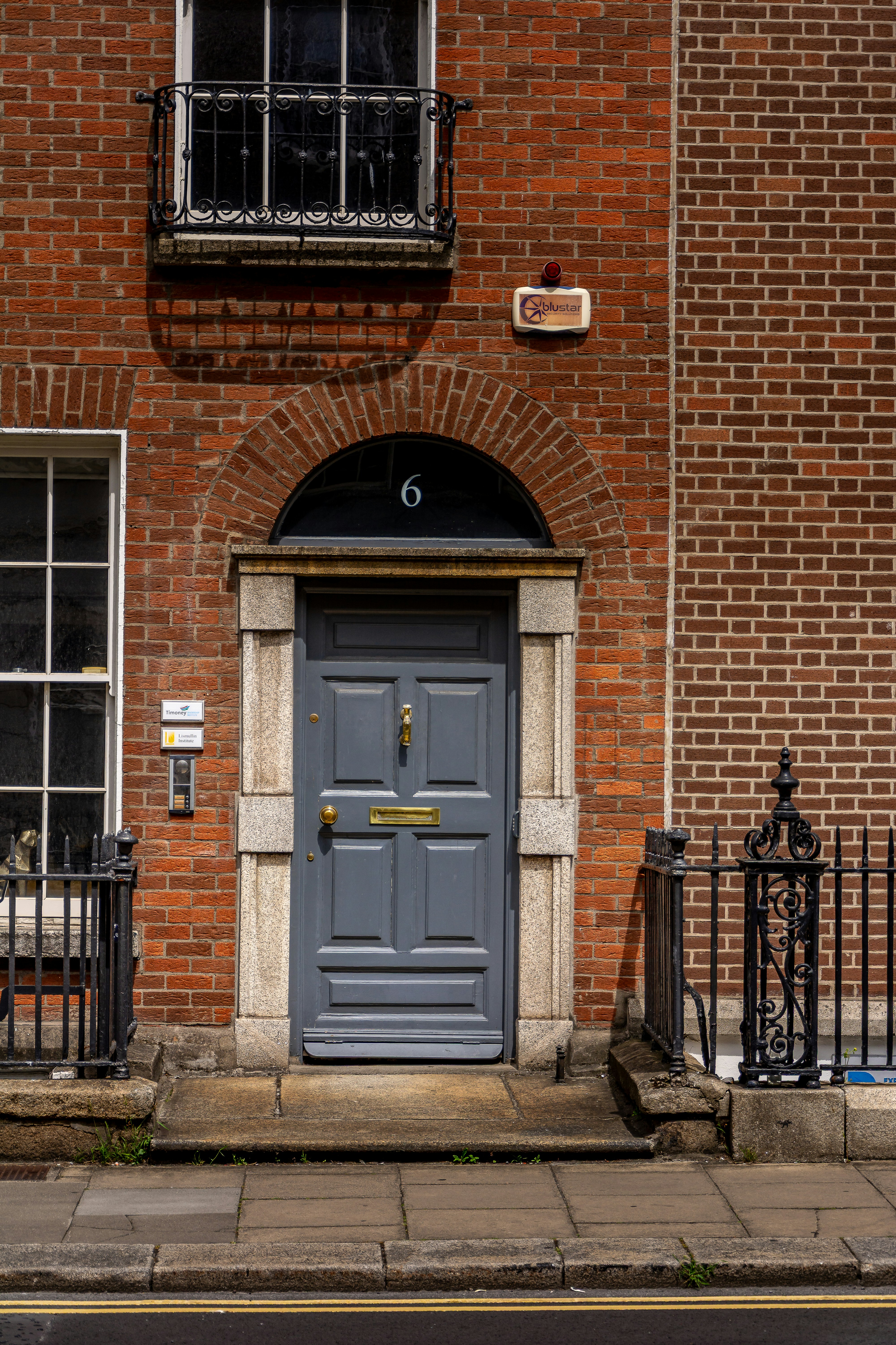 The Doorway at No. 6: A Brick Facade with a Quiet Entrance