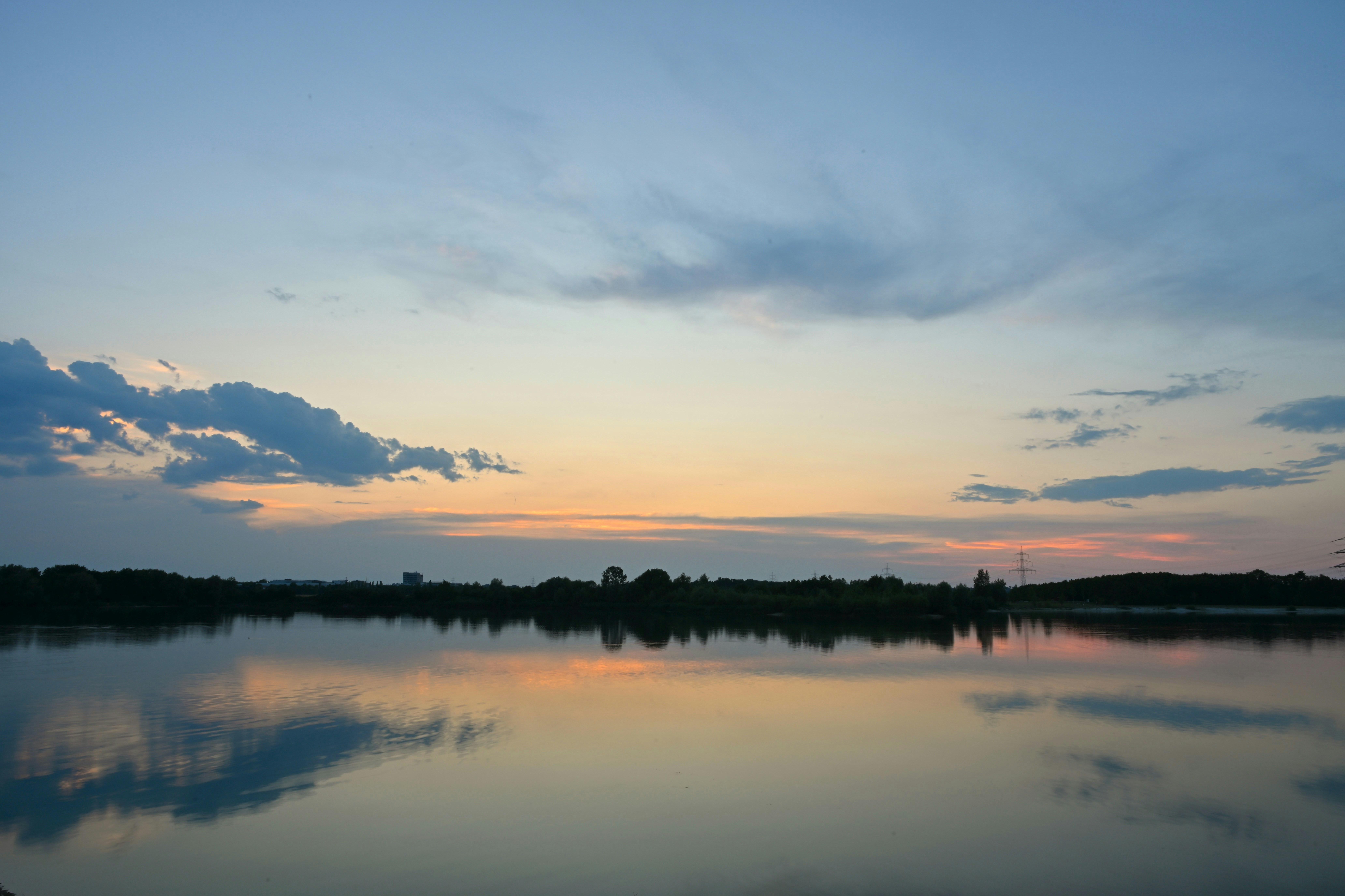 Mirror at Dusk: A Serene Lake Silhouette