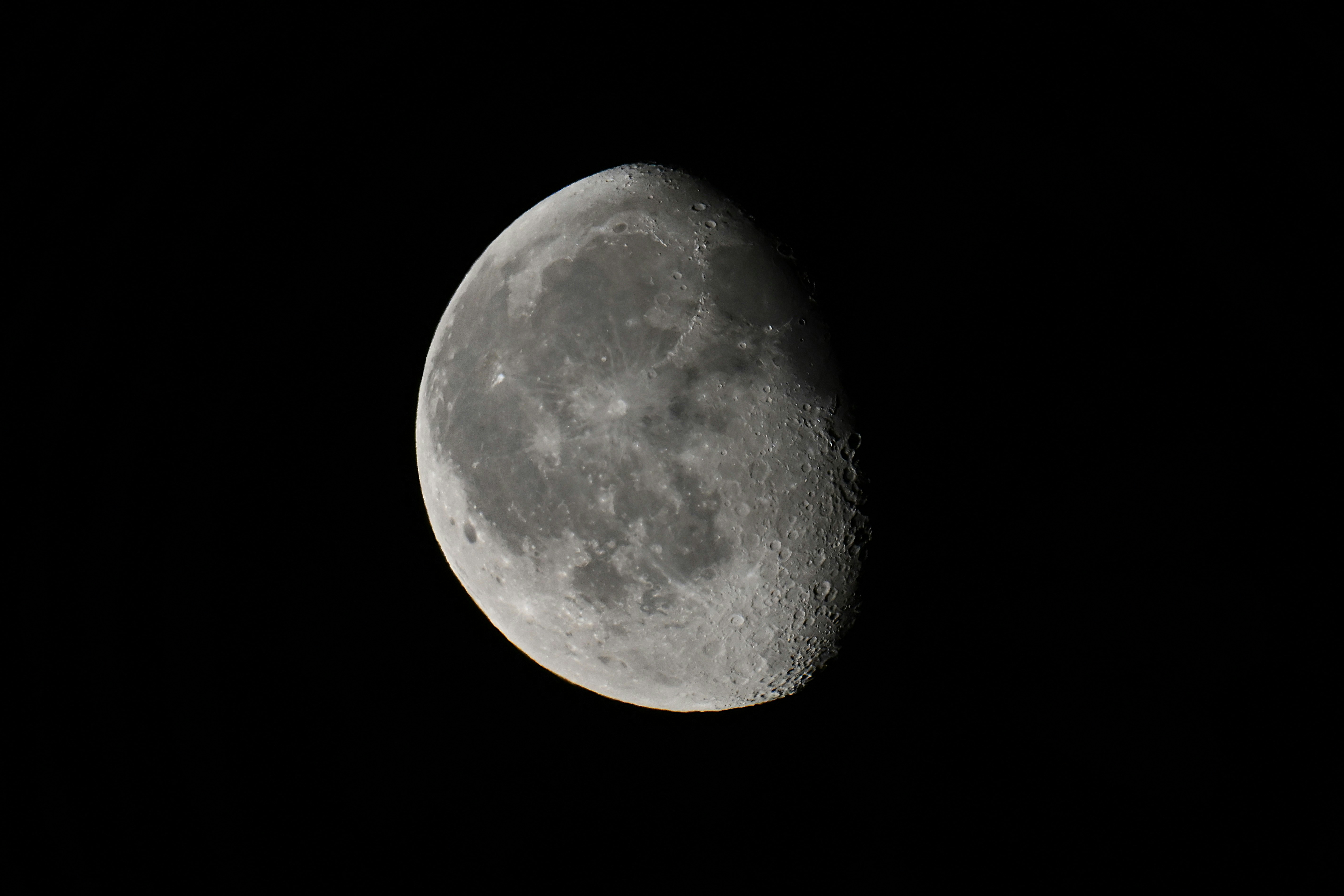 Crescent Moon Emerges from Velvet Darkness