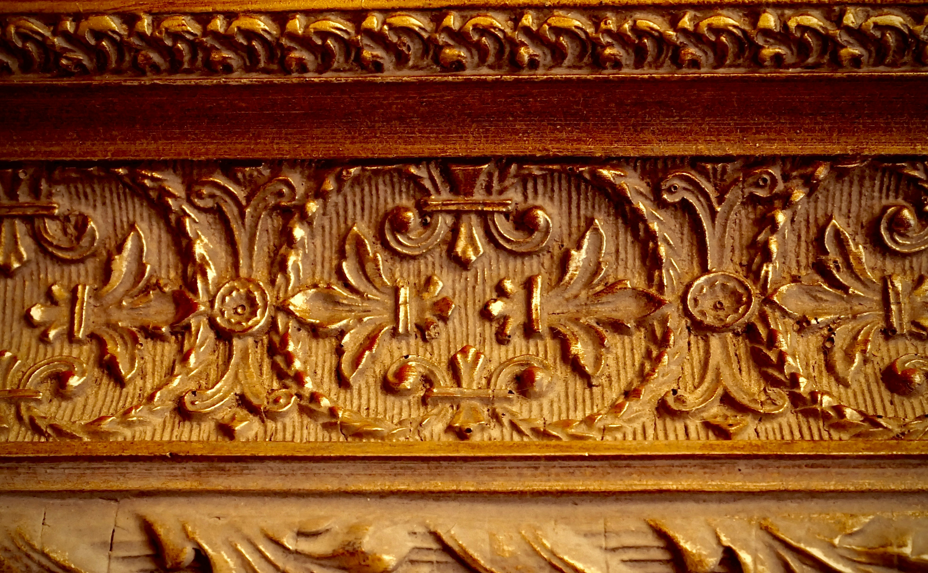 Golden Carvings: A Glimpse into Ornate Woodwork Detail