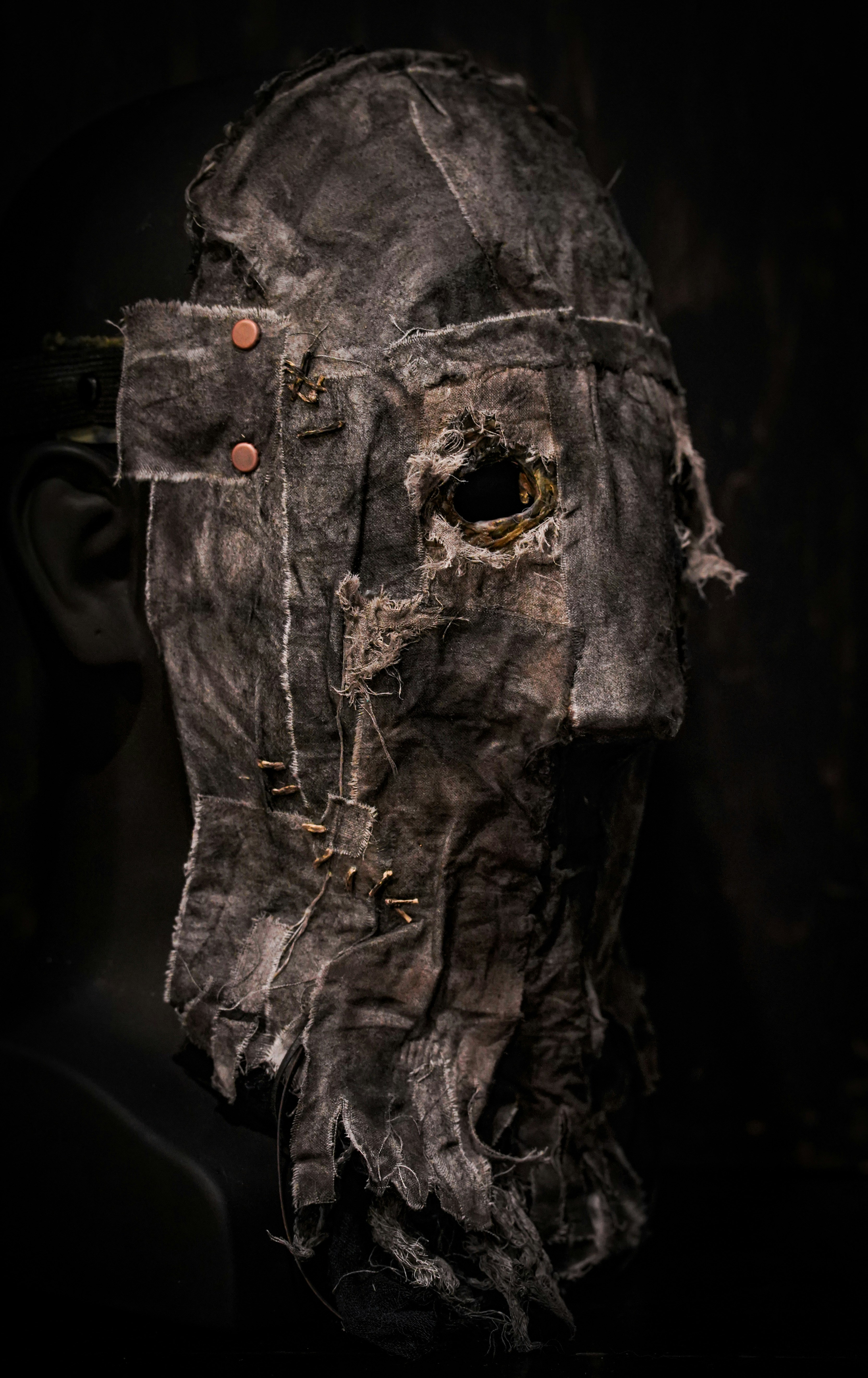 The Tattered Mask: A Silent Portrait of Decay