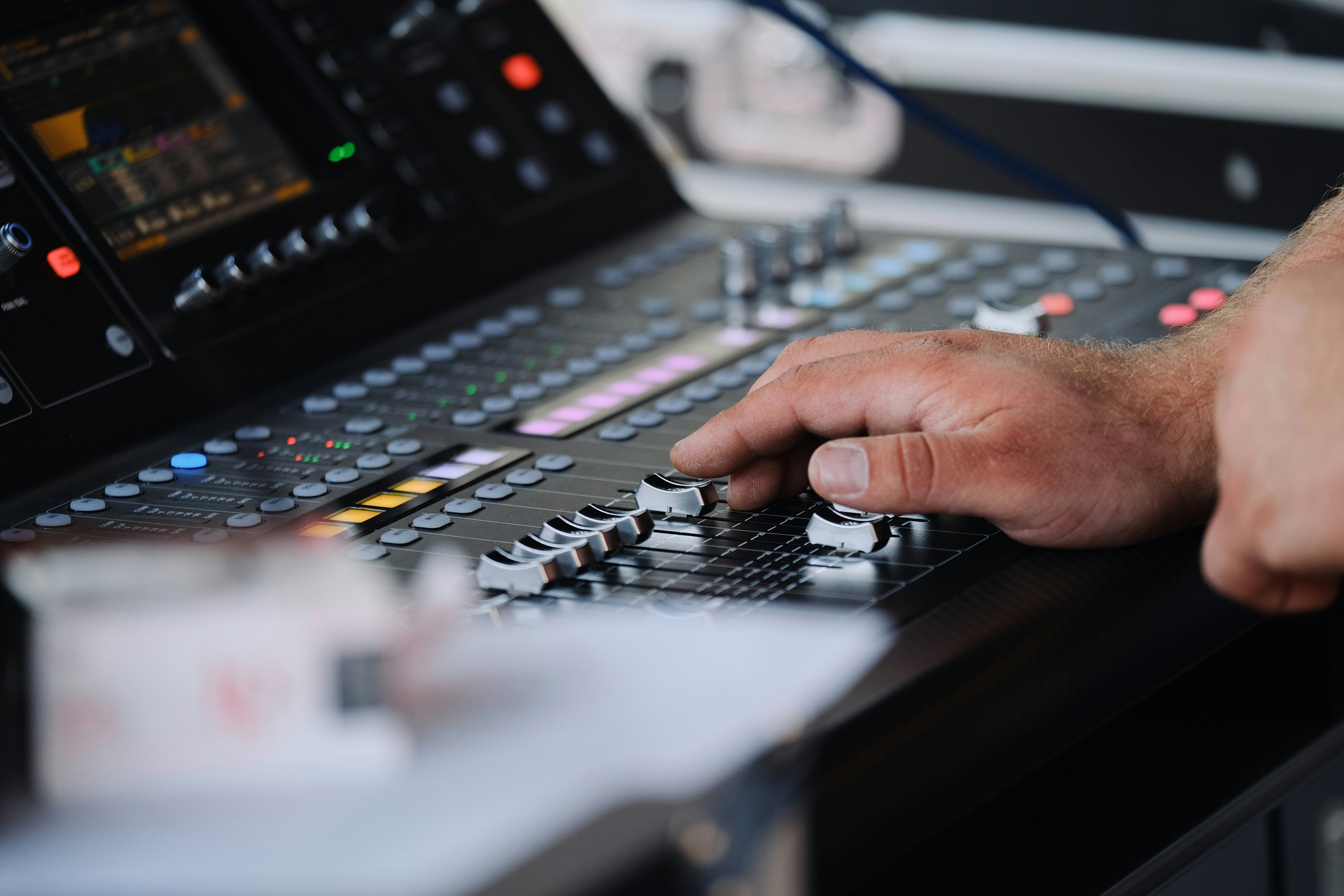 Hands on the Mixing Console: Precision in Motion