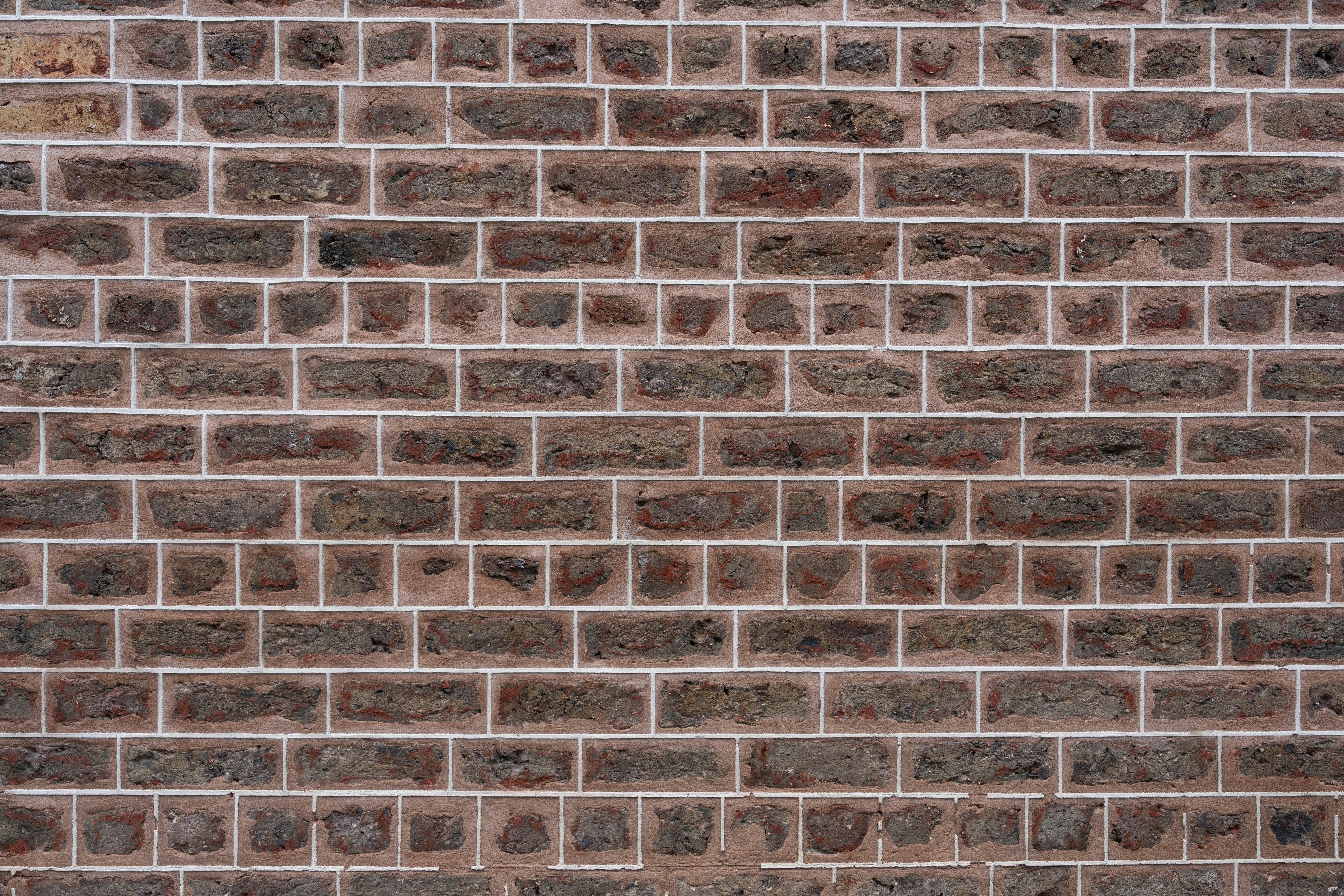 Brickwork Mosaic: A Quiet Pattern of Faded Red and Brown