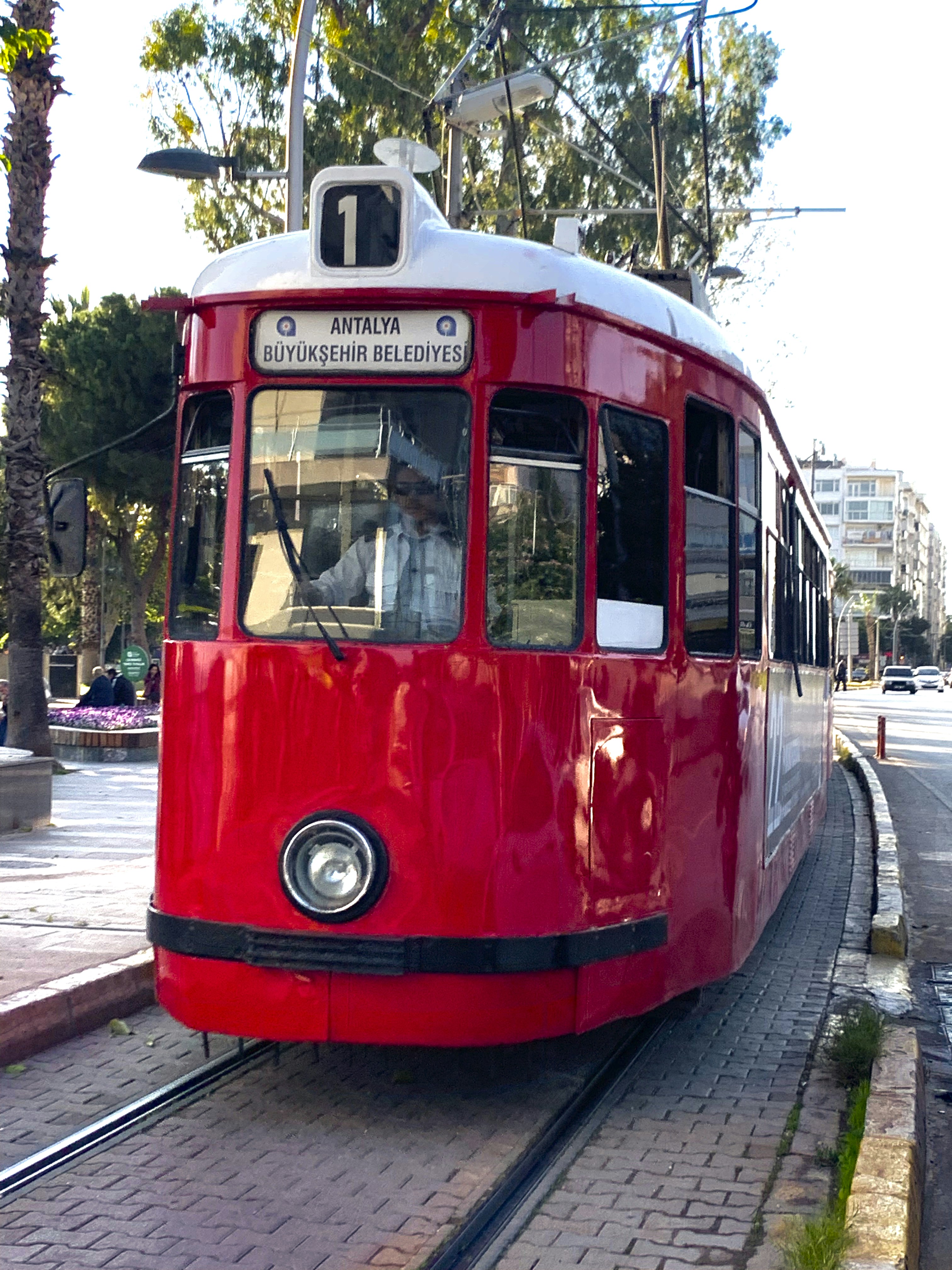 Red Streetcar Cresting the Tram Tracks in Antalya