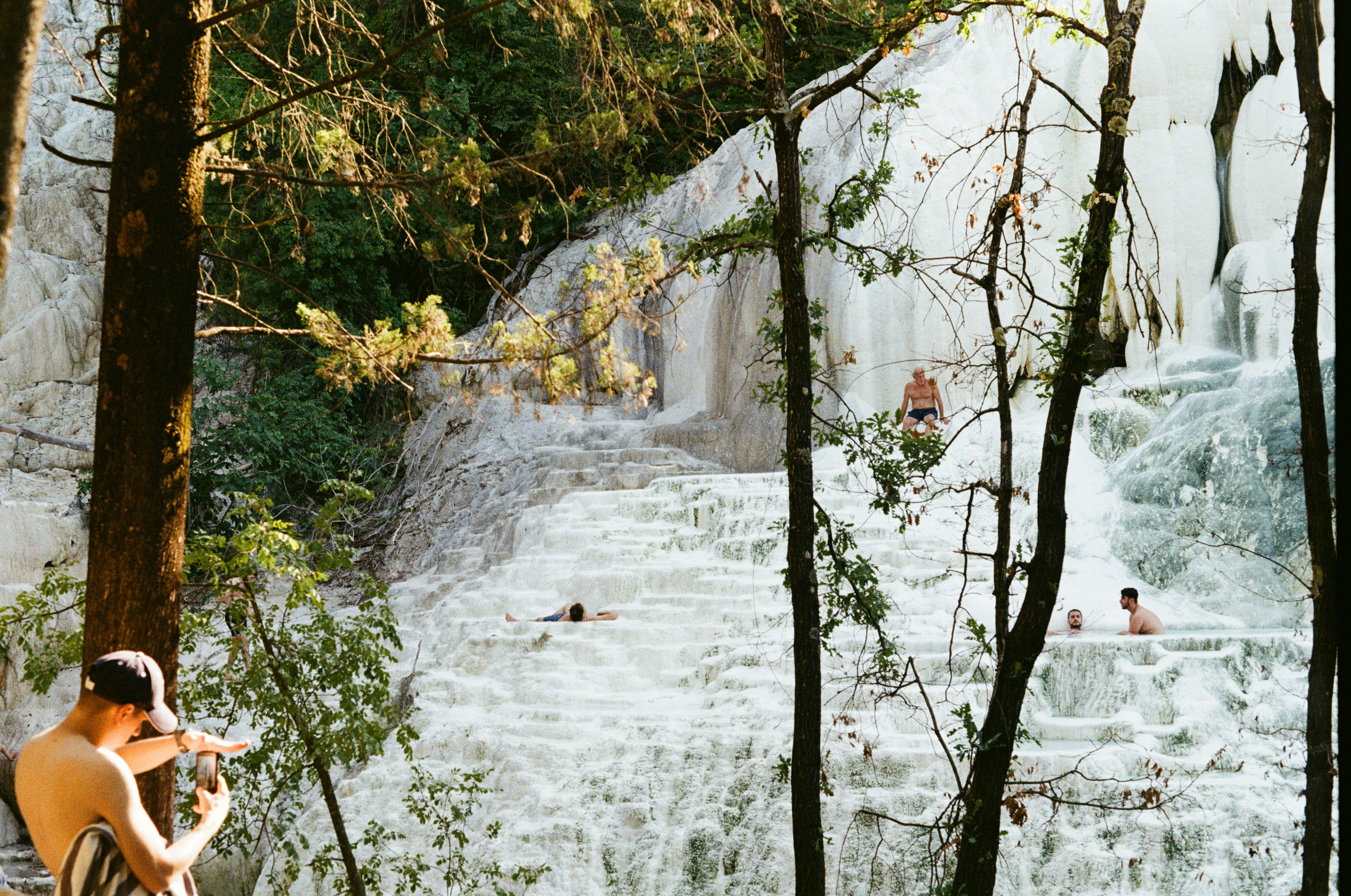 Cascade of Humans: Gentle Repose by the Terraced Falls