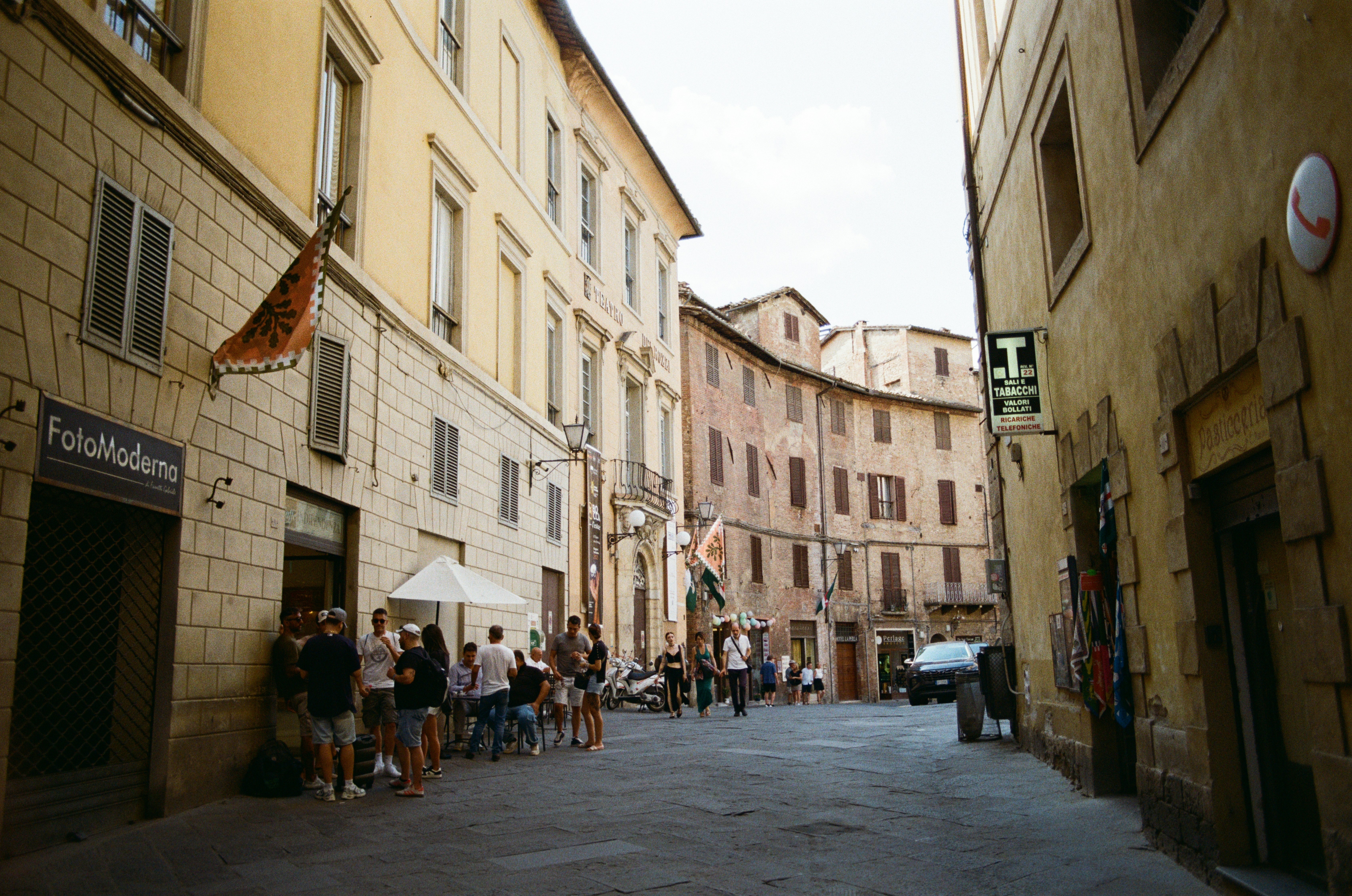 Cobbled Street Convergence: A Quiet Afternoon in the Italian Quarter