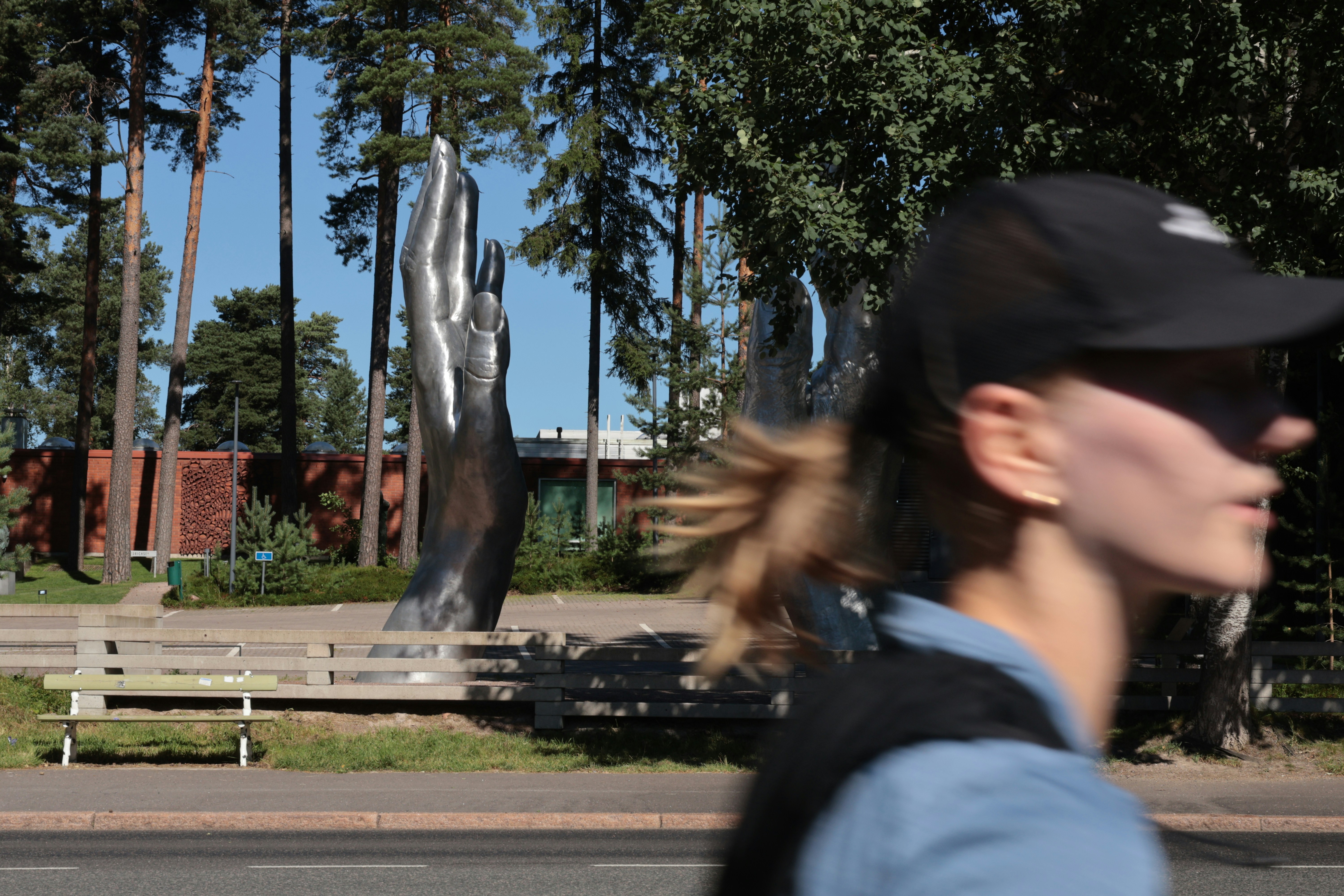 Blurring Pedestrian Grounded by a Silent Monument