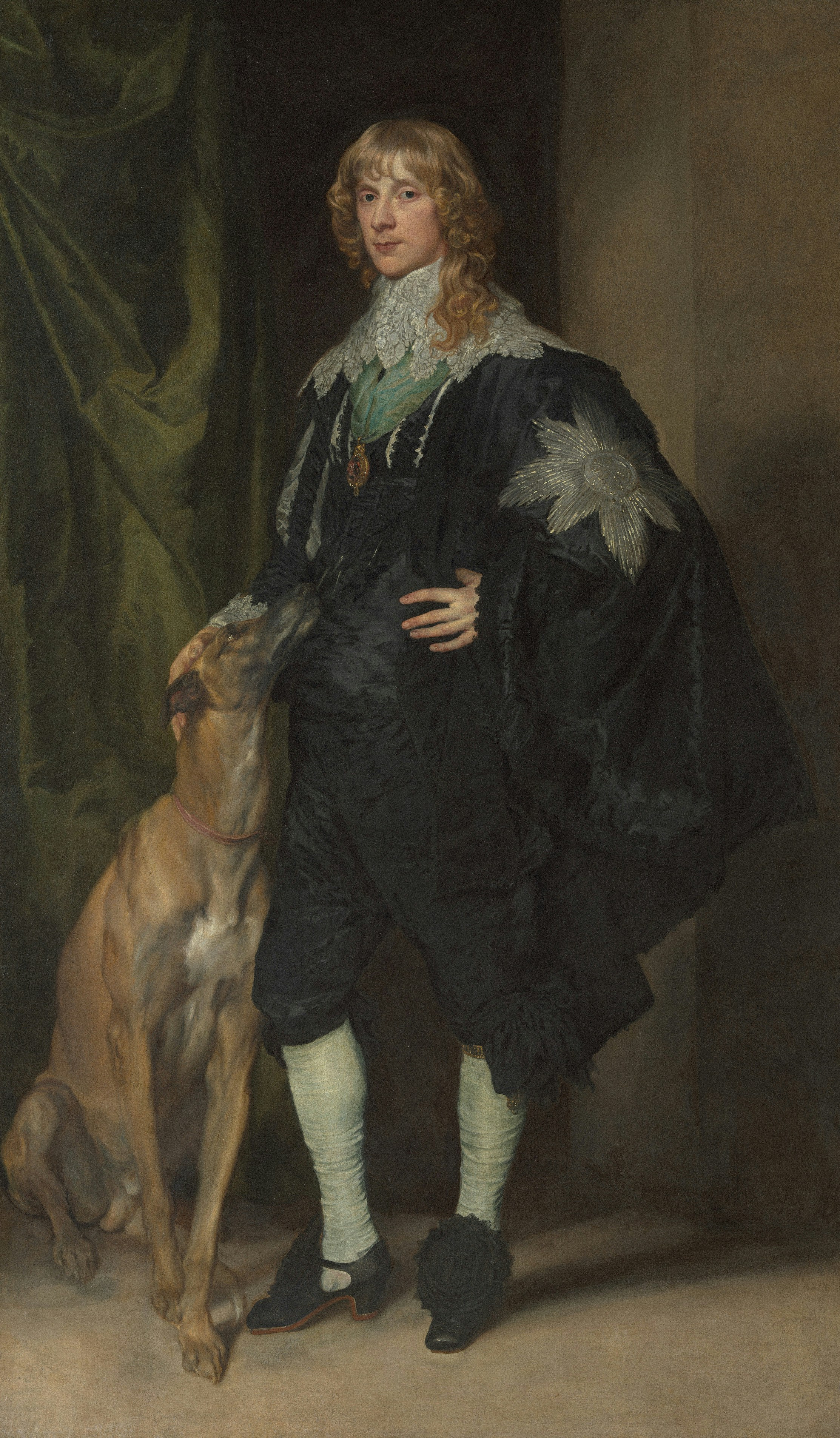 Gentleman and hound: a poised portrait in velvety black