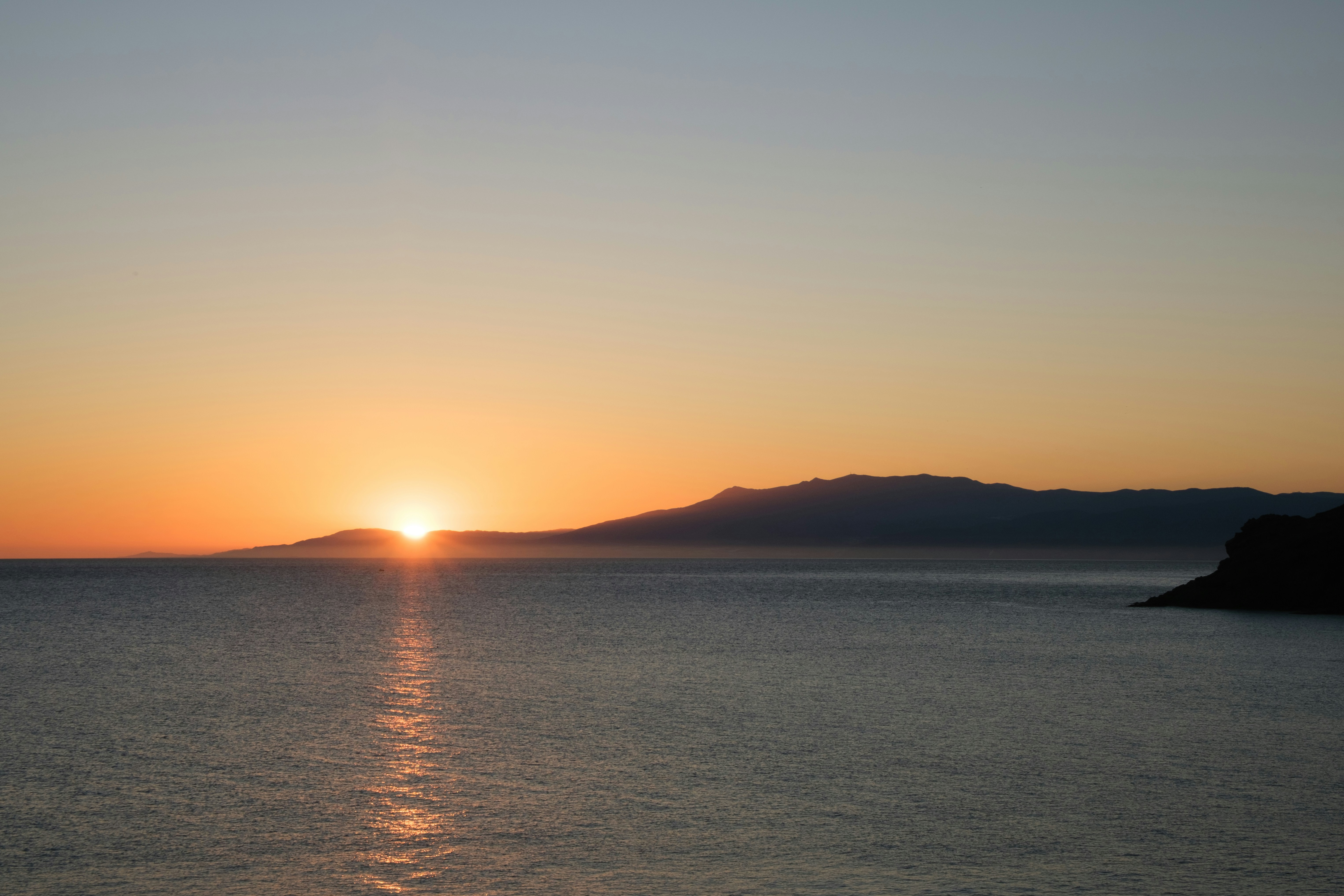 Sunlit Crest: The Quiet Horizon at Dusk
