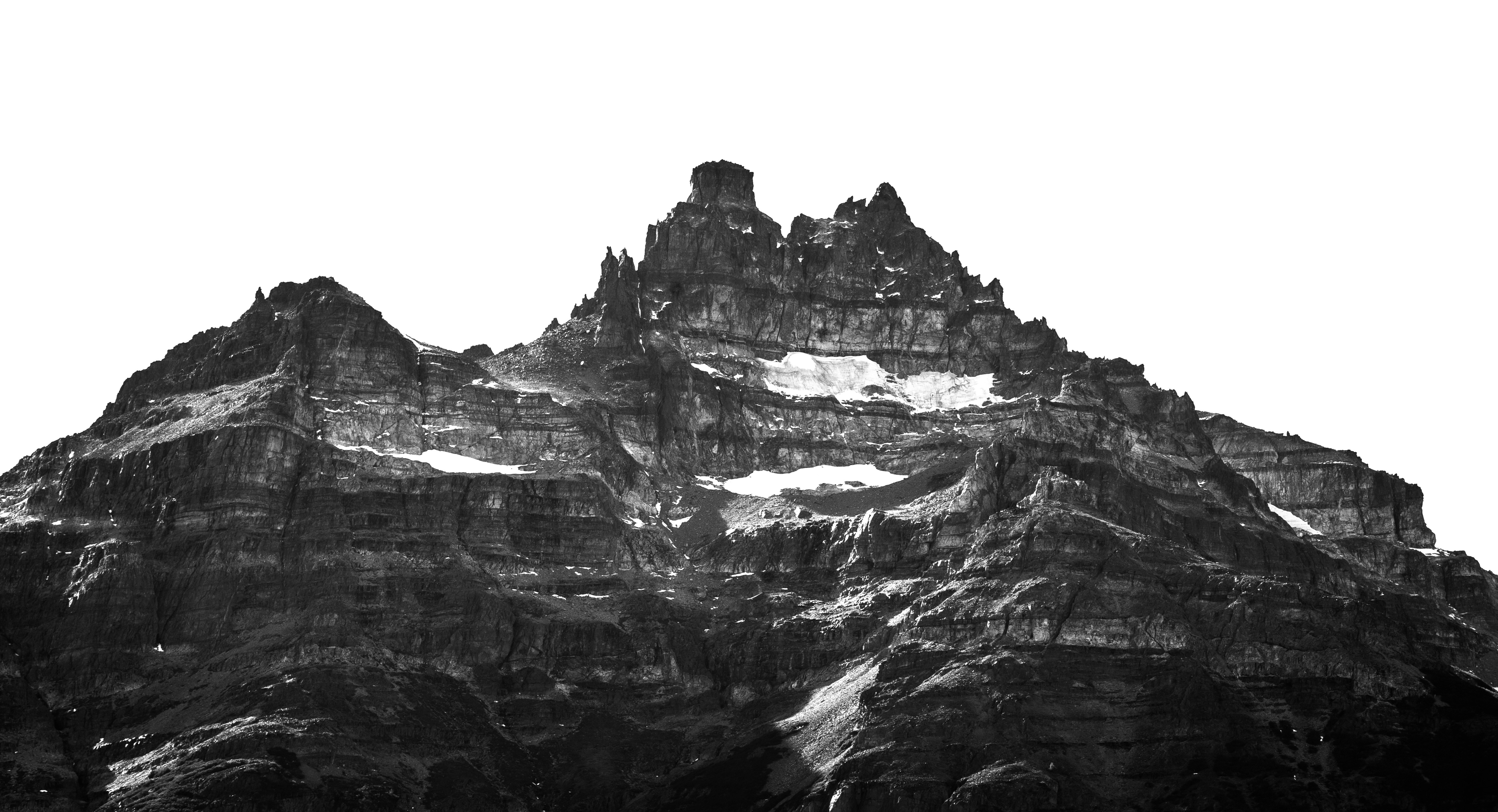 Starlit Summit: A Monochrome Peak Piercing the Snowline