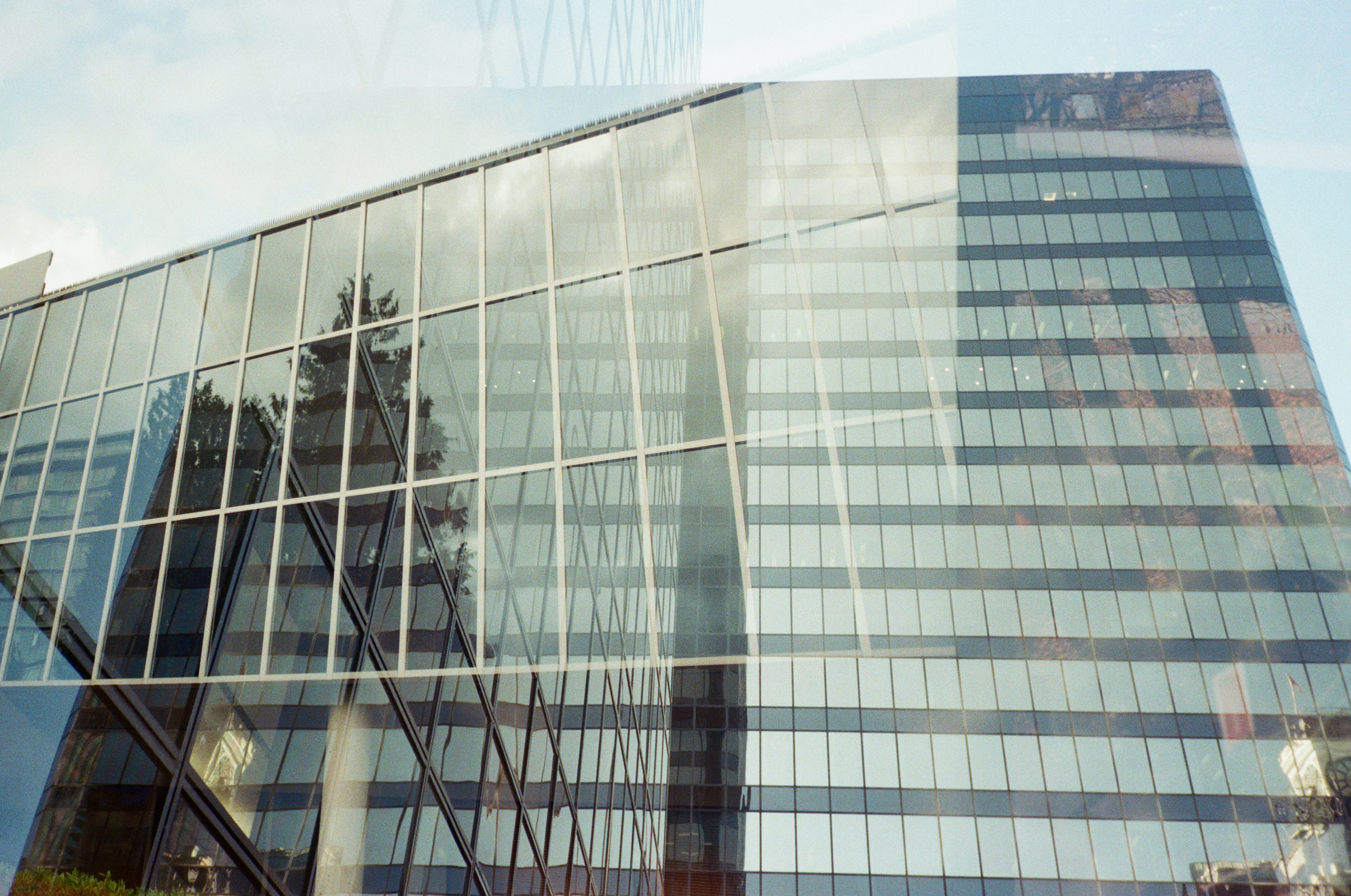 Shooting double exposures in camera are unpredictable. A majority of images don't work that well but at times, good things happen. A couple buildings in downtown Vancouver mix together in an organic manner.